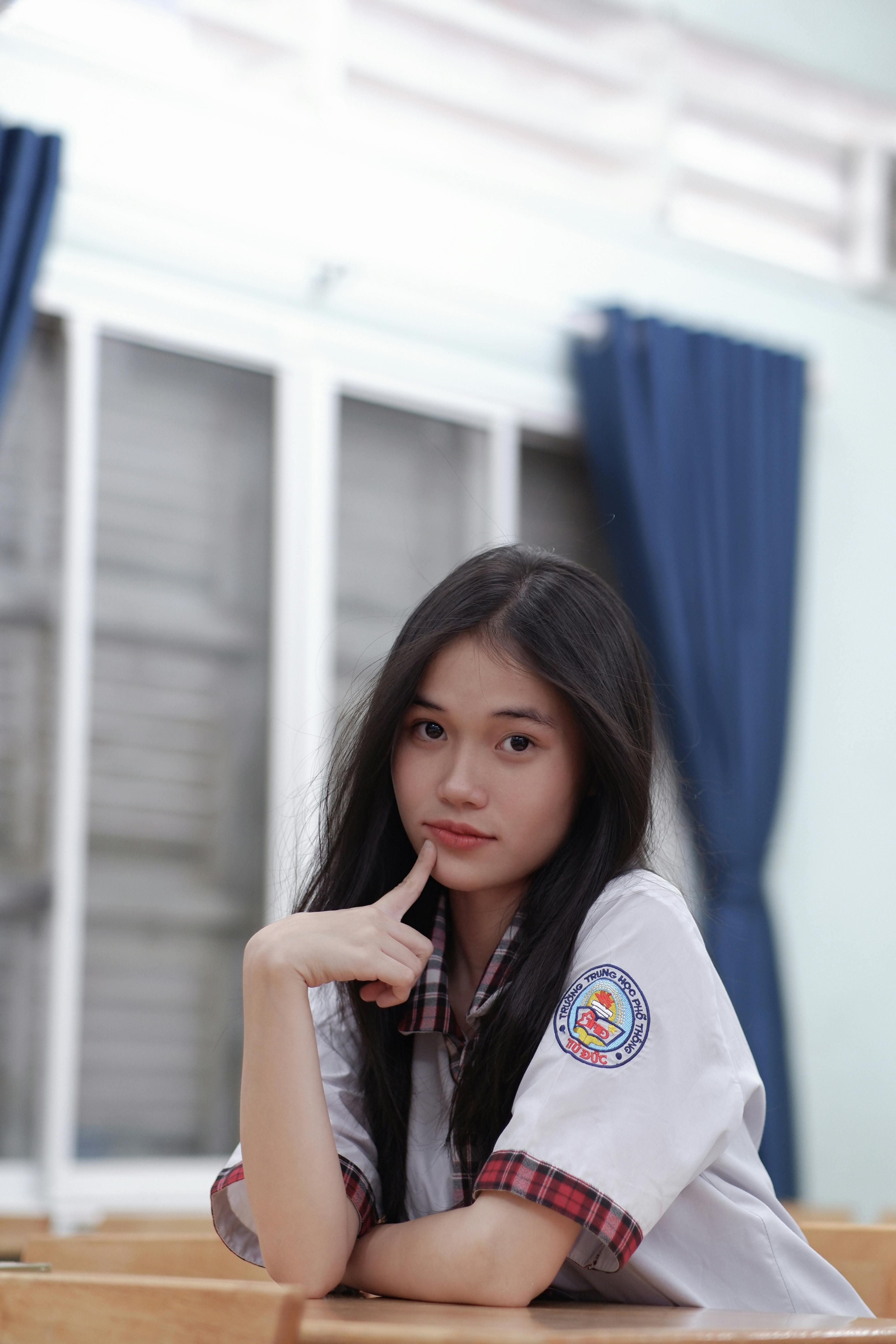 Confident Student in Classroom Portrait · Free Stock Photo