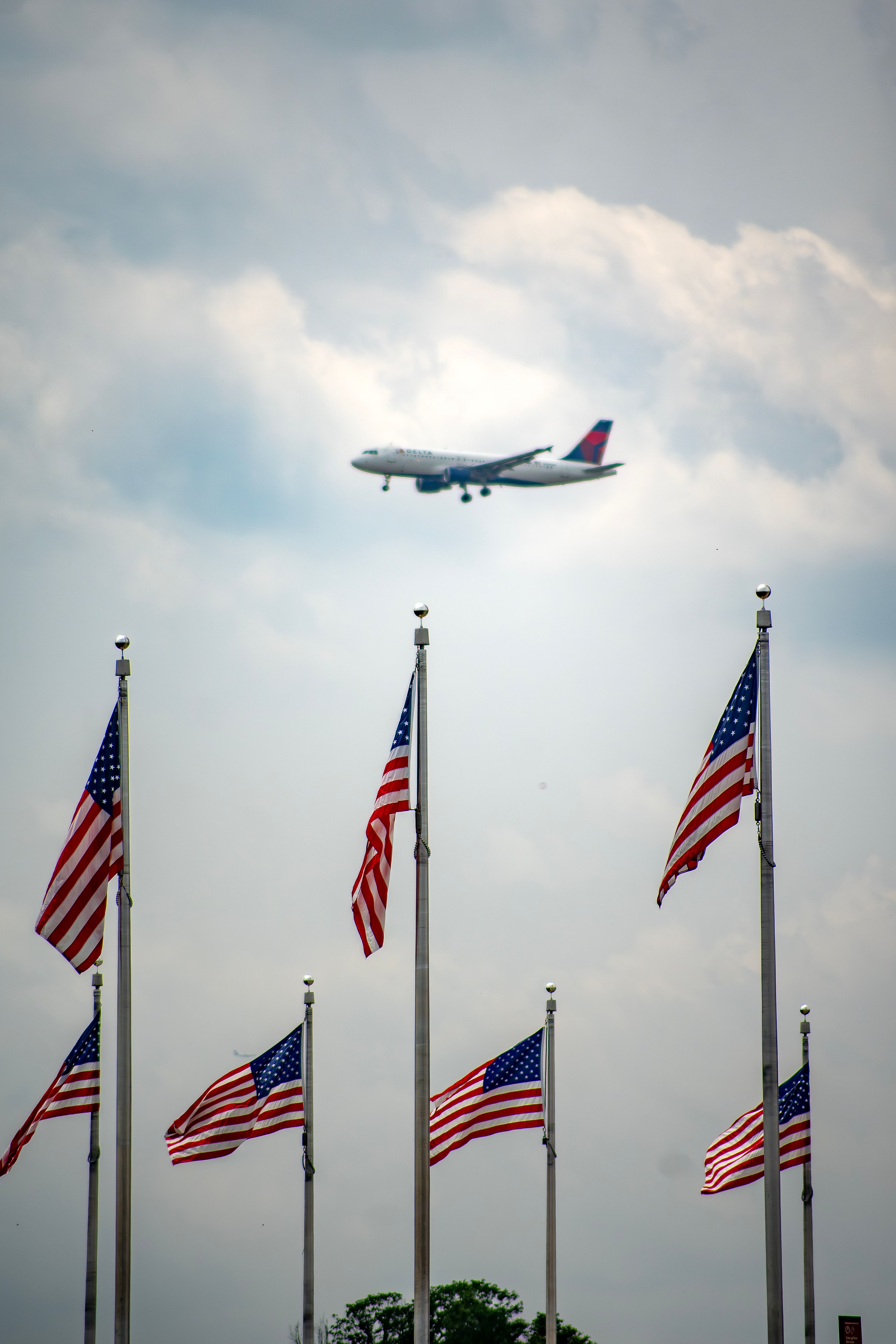 American Flags with Airplane in Flight · Free Stock Photo