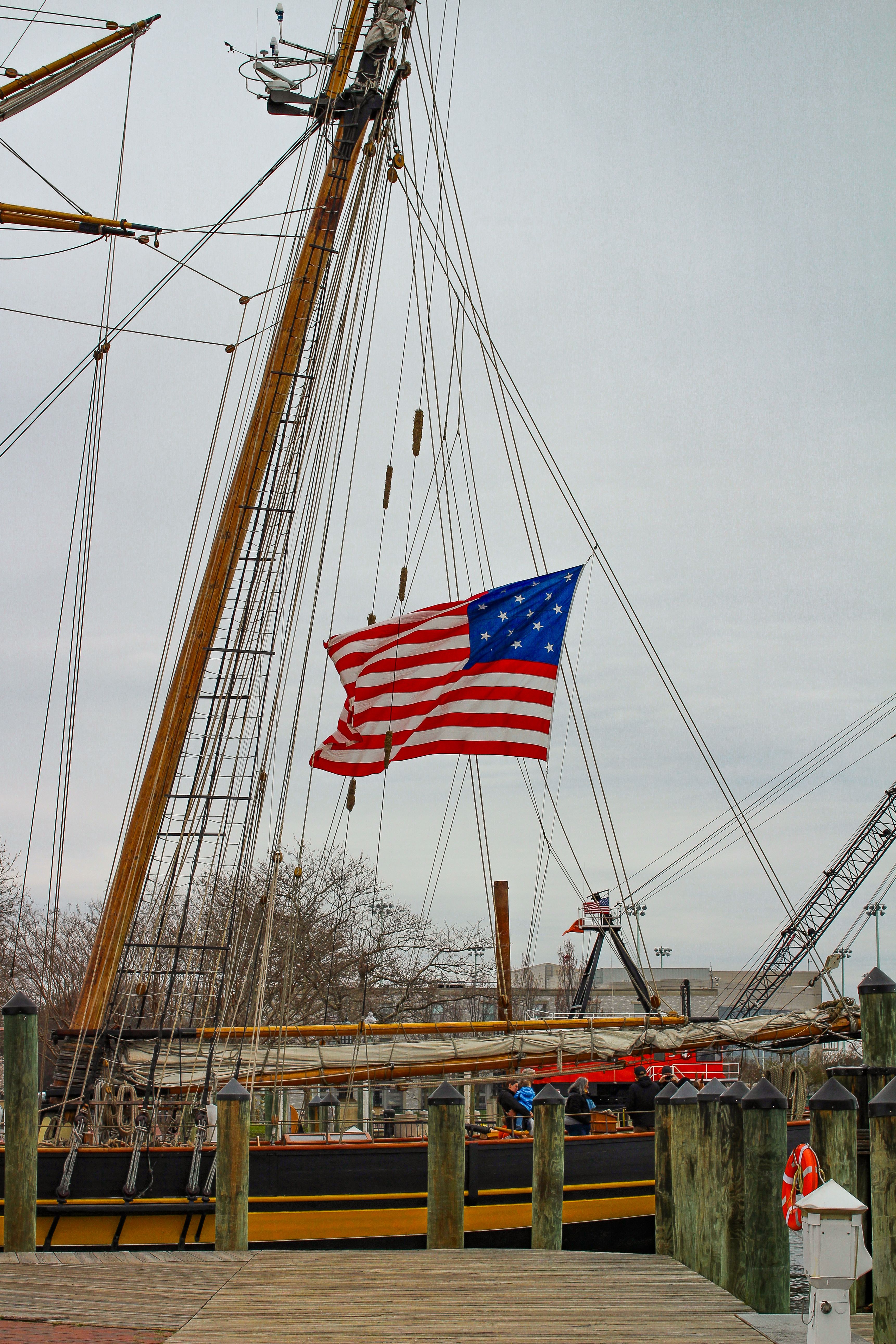 Historic Ship with American Flag in Annapolis Harbor · Free Stock Photo