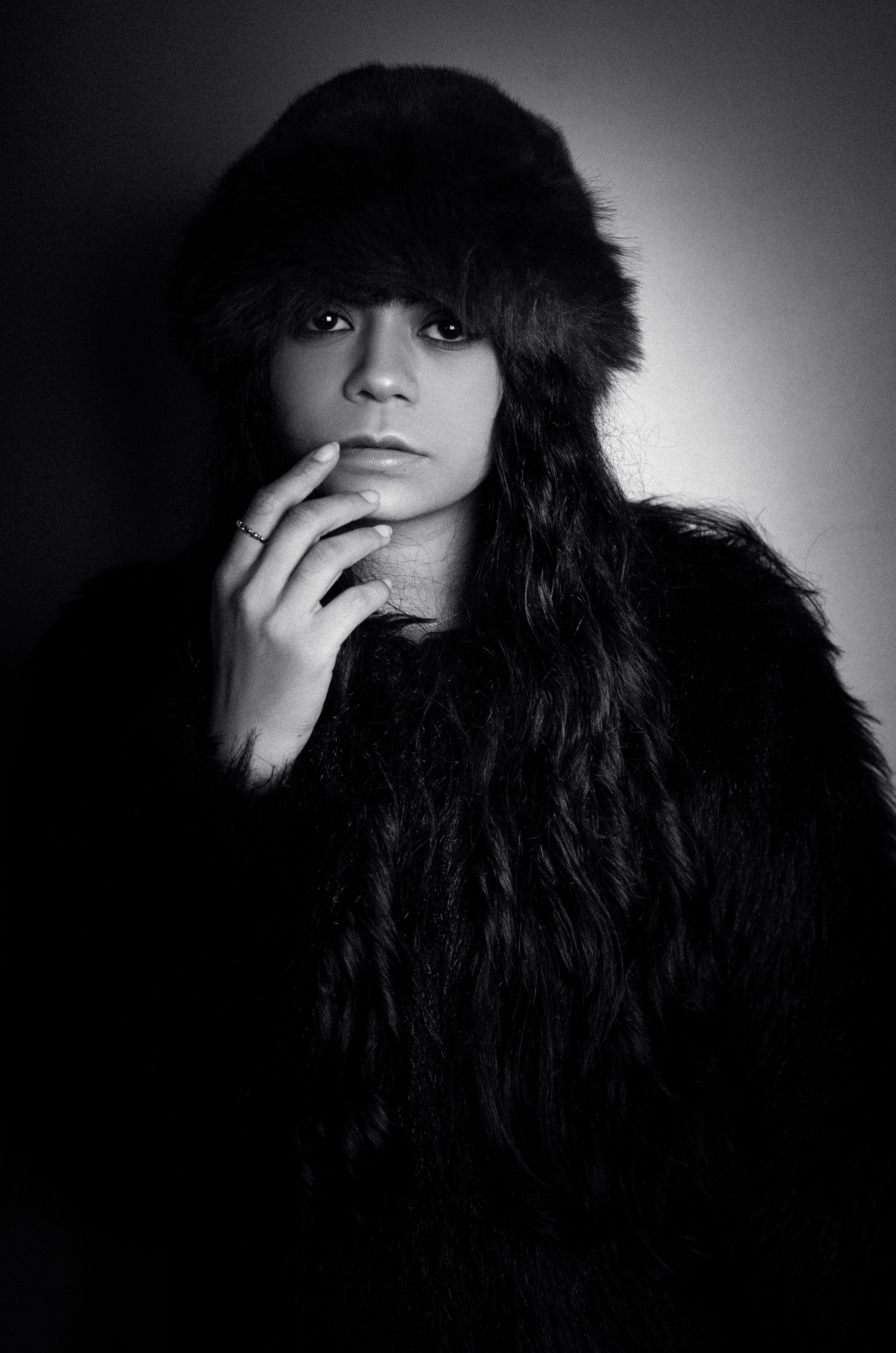 Elegant Black and White Fur Fashion Portrait · Free Stock Photo
