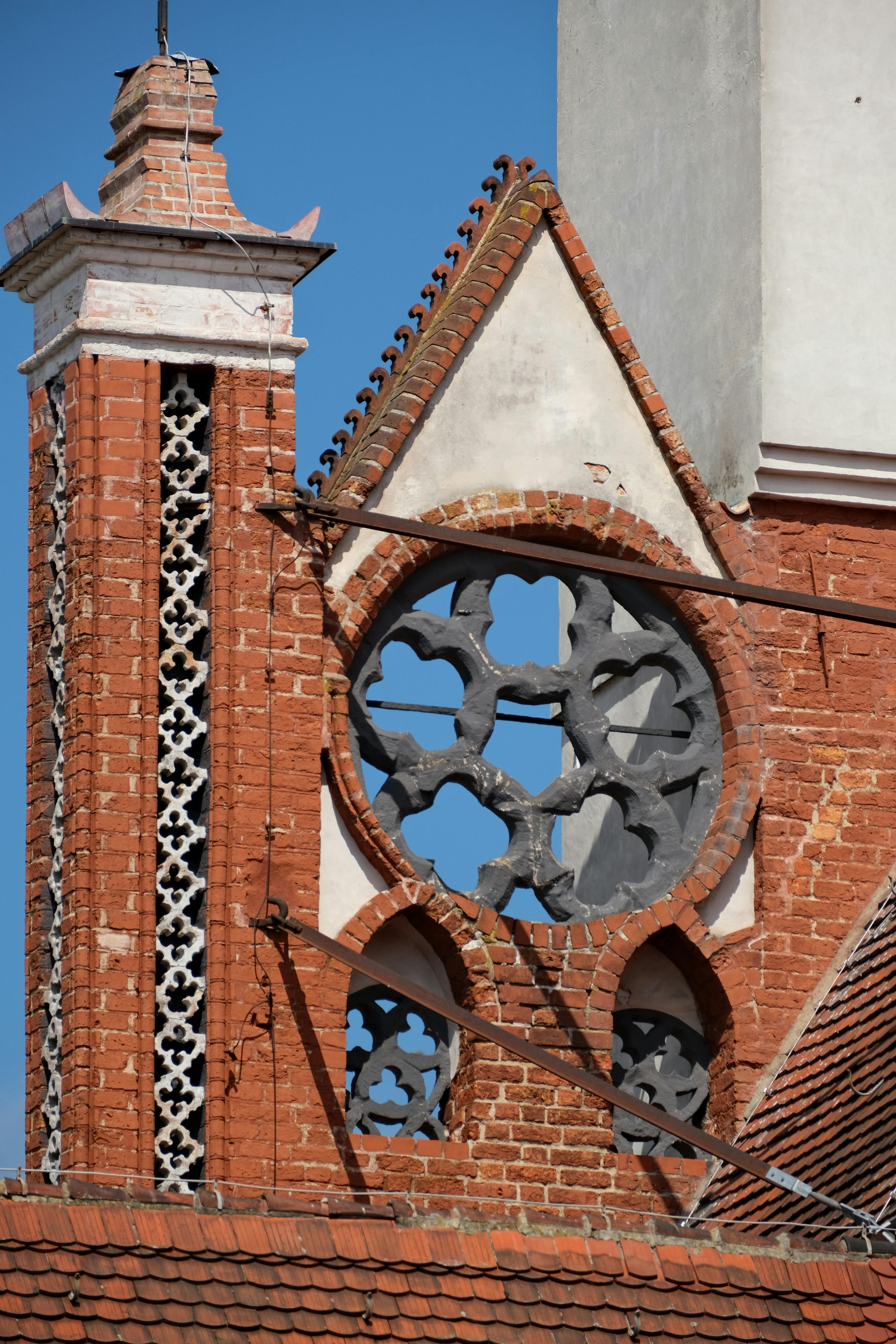 Detailed Gothic Brick Architecture Close-up · Free Stock Photo