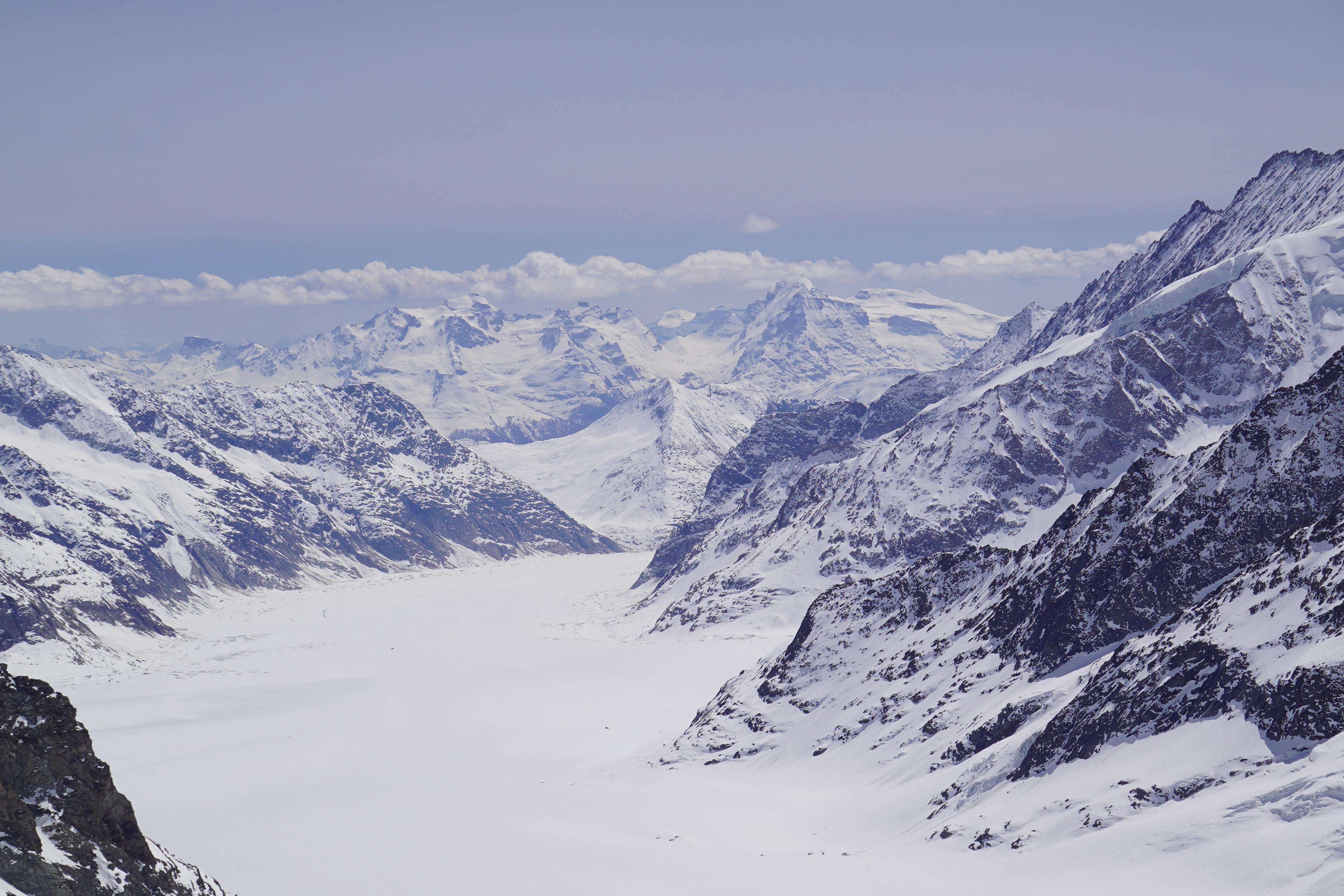 Stunning Aerial View of Snow-Capped Swiss Alps · Free Stock Photo