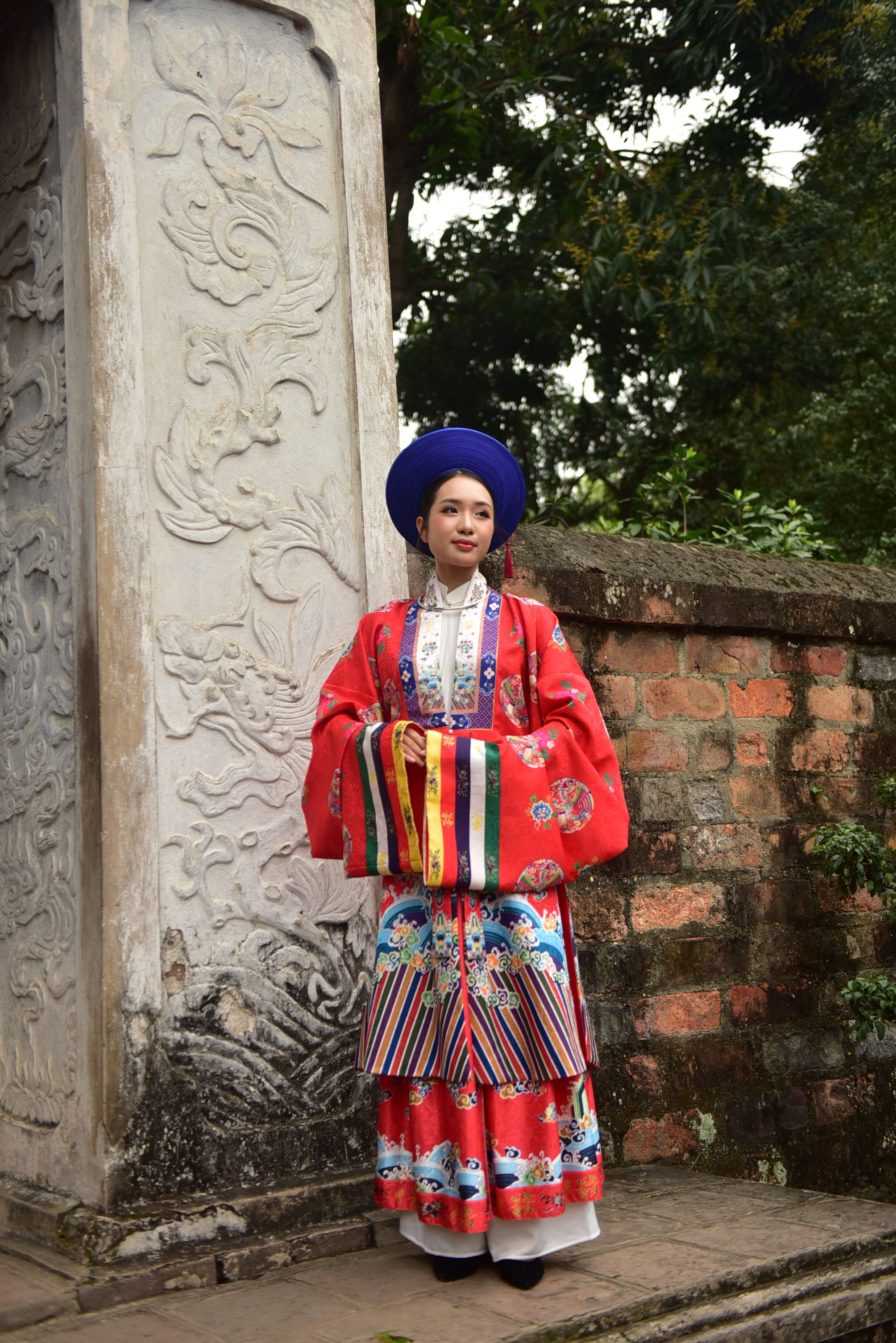Traditional Asian Dress Portrait in Historic Setting · Free Stock Photo
