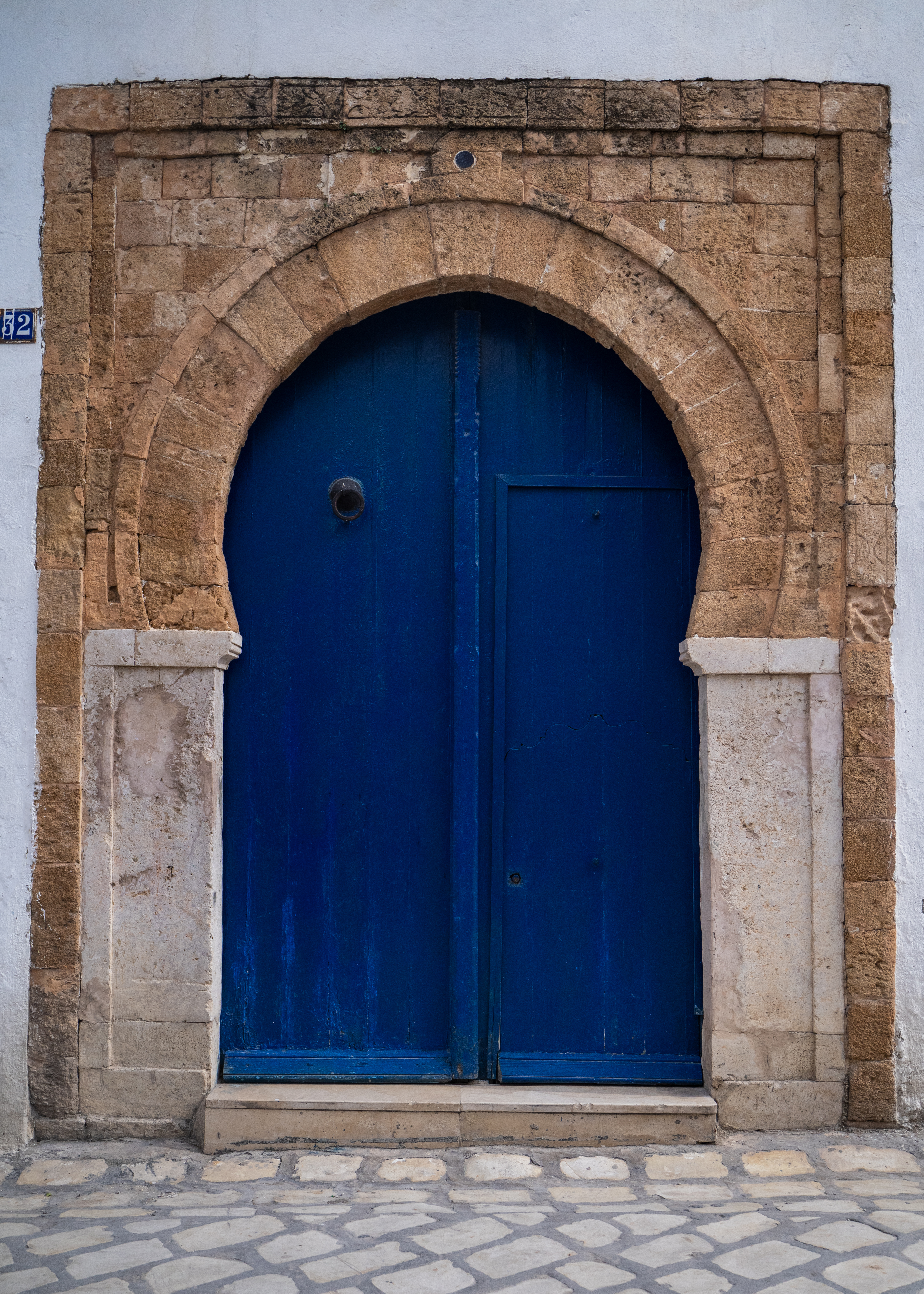 Ornate Blue Doorway with Stone Arch in Medina · Free Stock Photo