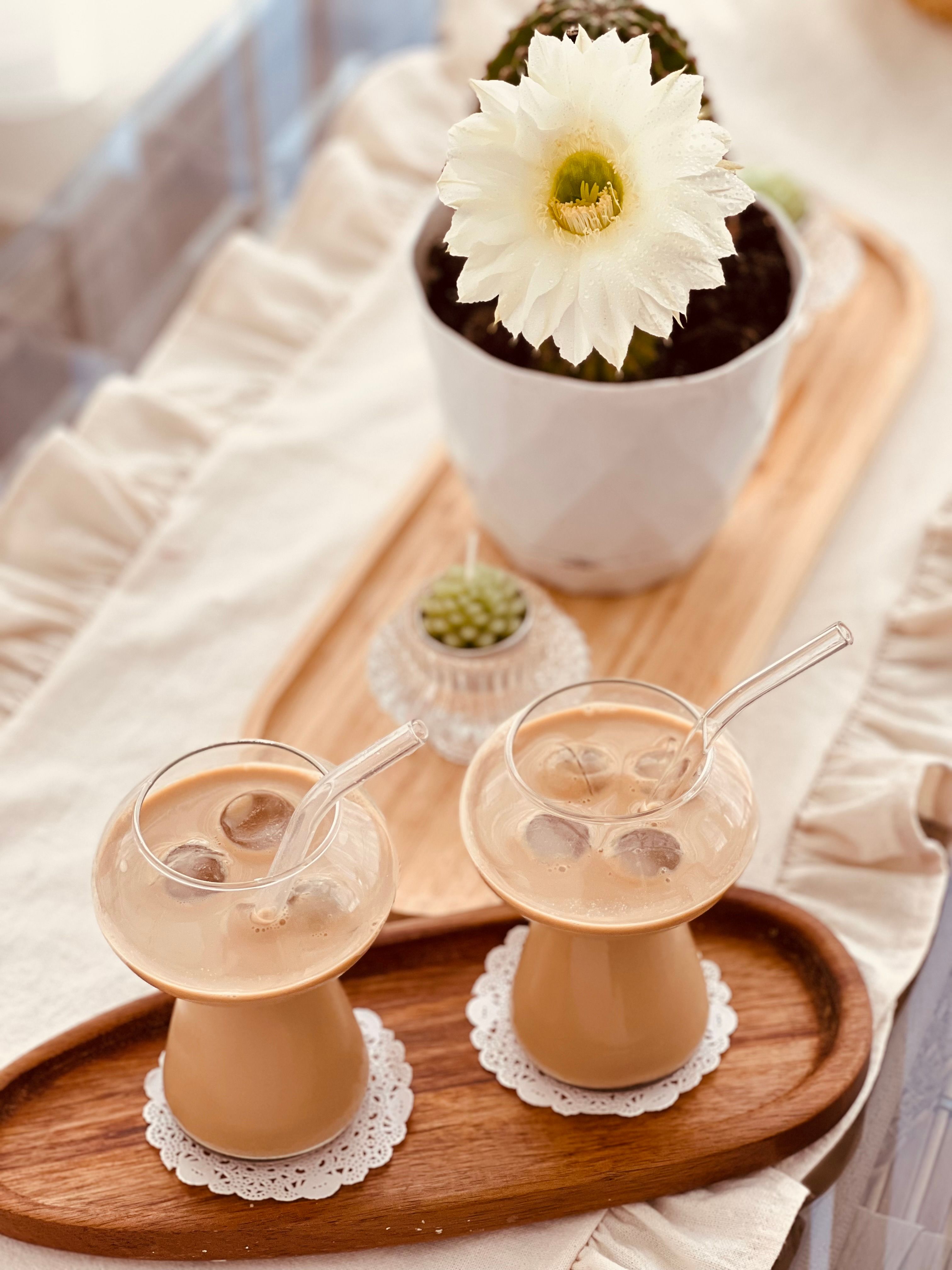 Aesthetic Iced Coffee and Flower Arrangement · Free Stock Photo