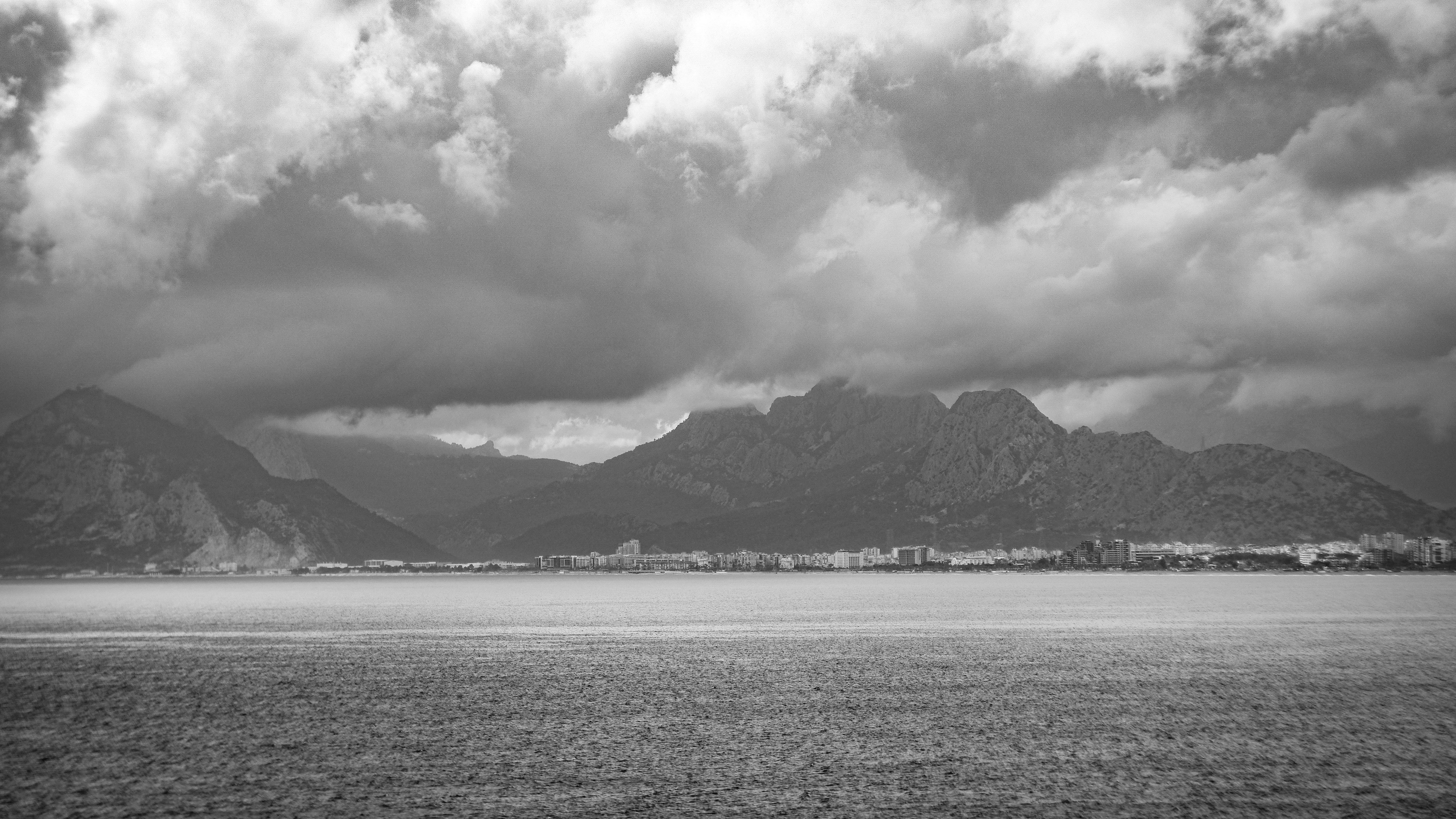 Dramatic Mountain Landscape Under Stormy Skies · Free Stock Photo