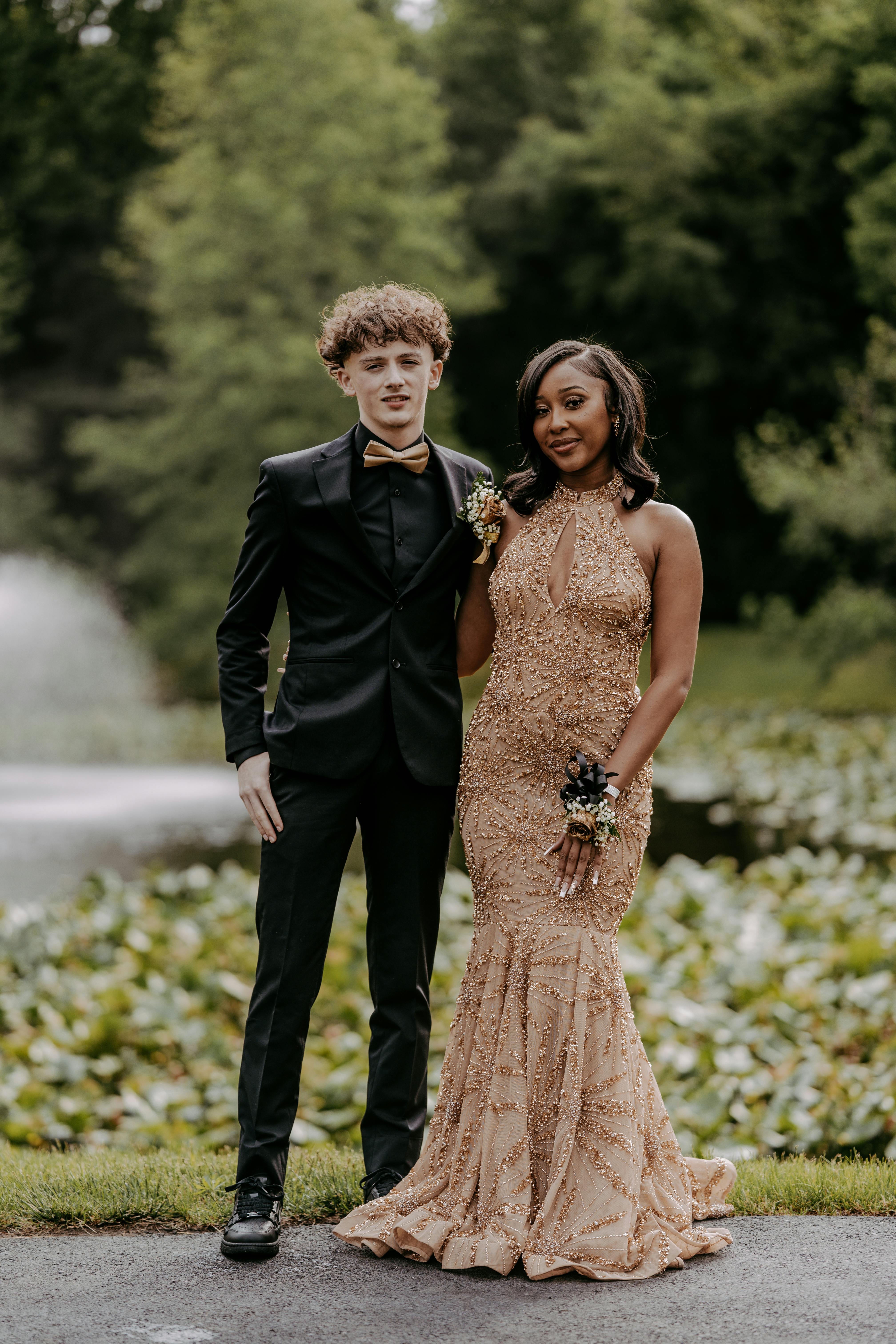 Elegant Prom Couple Posing by Scenic Pond · Free Stock Photo