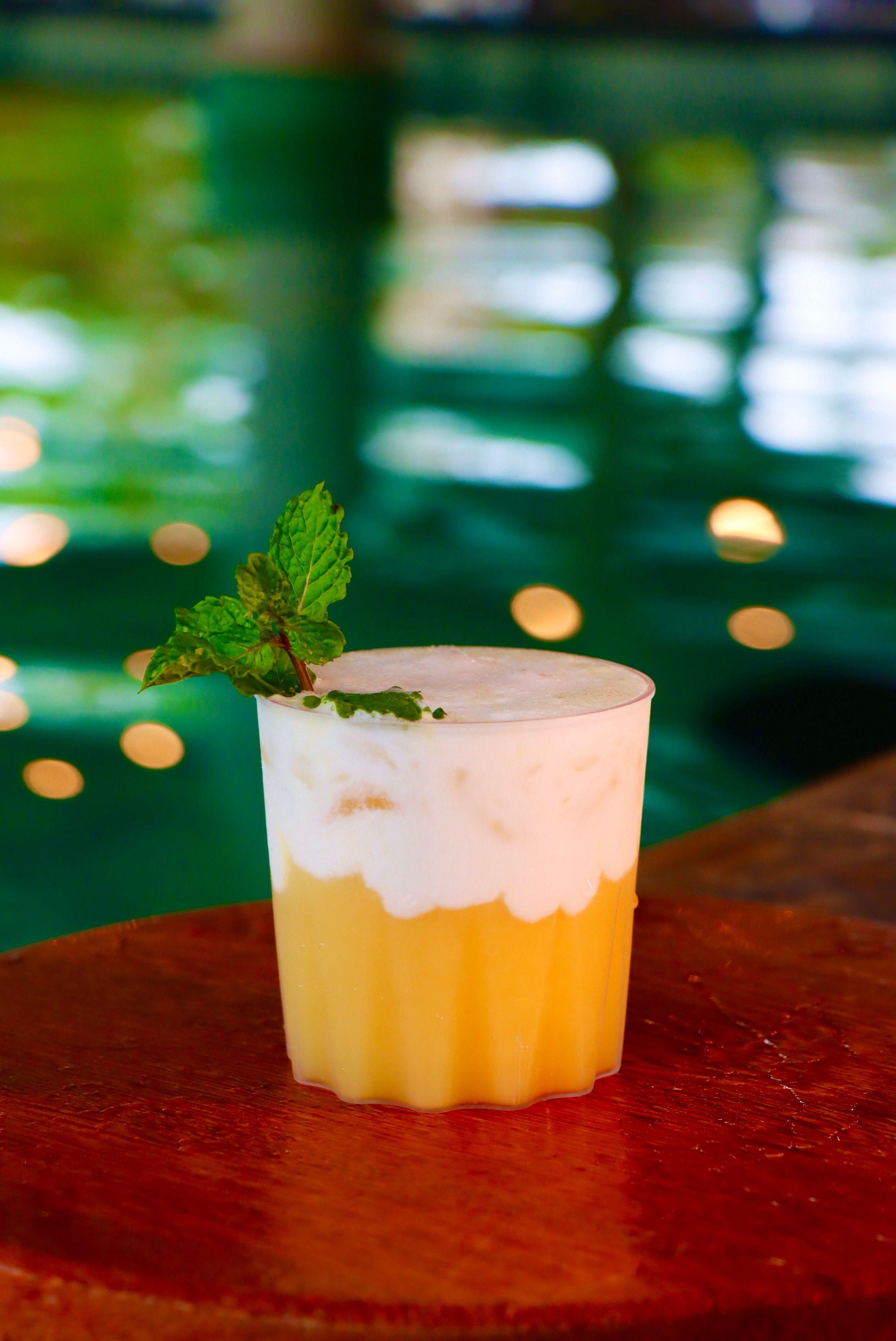 Refreshing Tropical Cocktail with Mint Garnish · Free Stock Photo