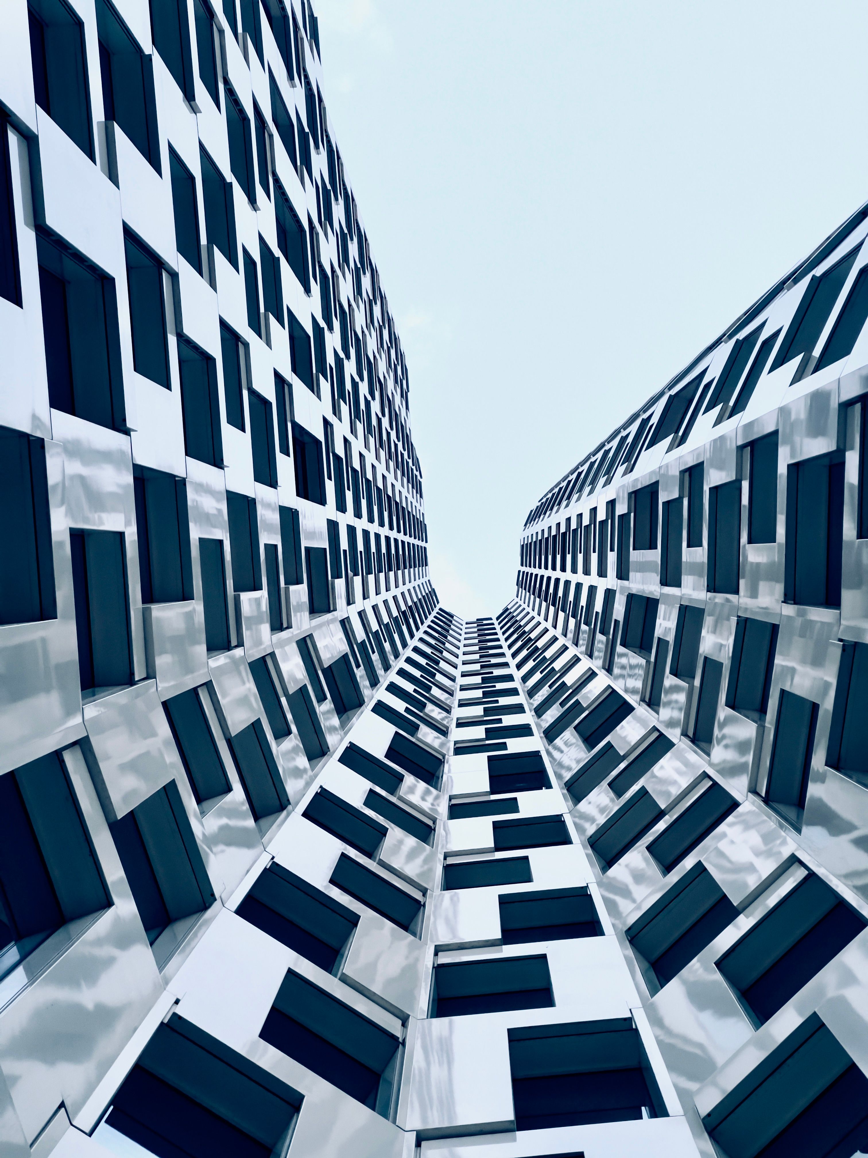 Modern Architectural Symmetry in Urban Skyline · Free Stock Photo