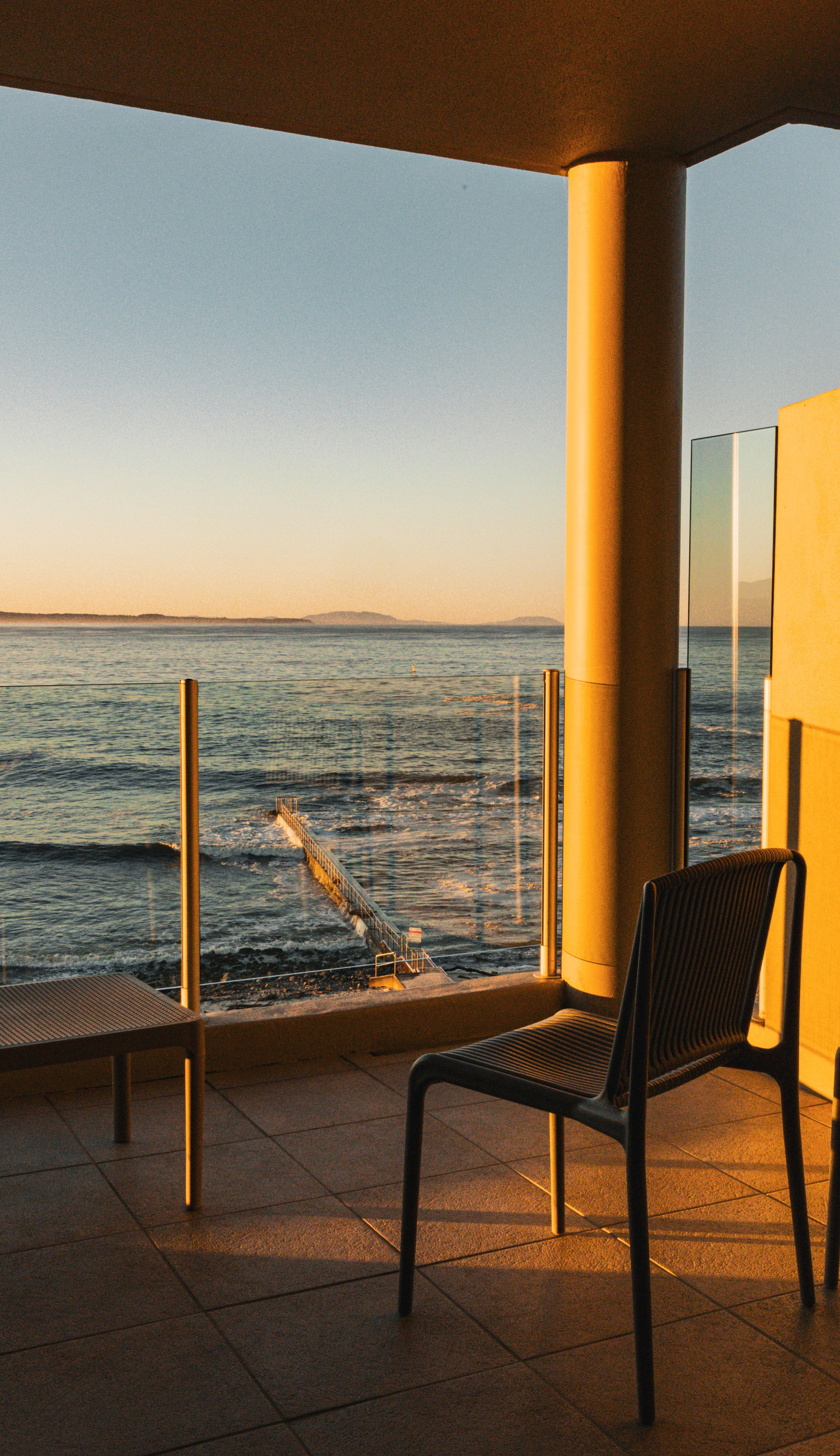 Coastal Balcony View at Sunset · Free Stock Photo