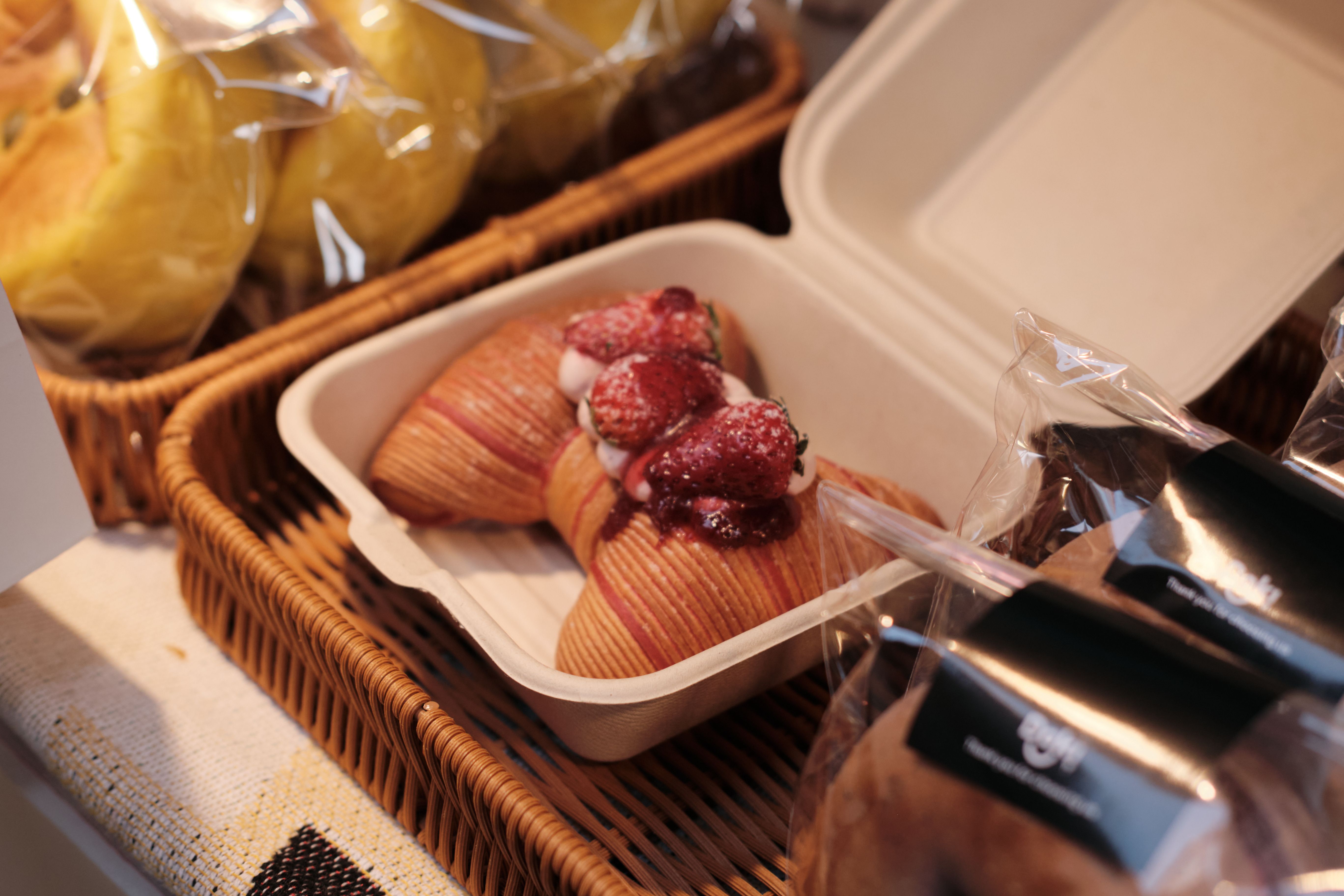 Delicious Strawberry Croissant Bakery Display · Free Stock Photo