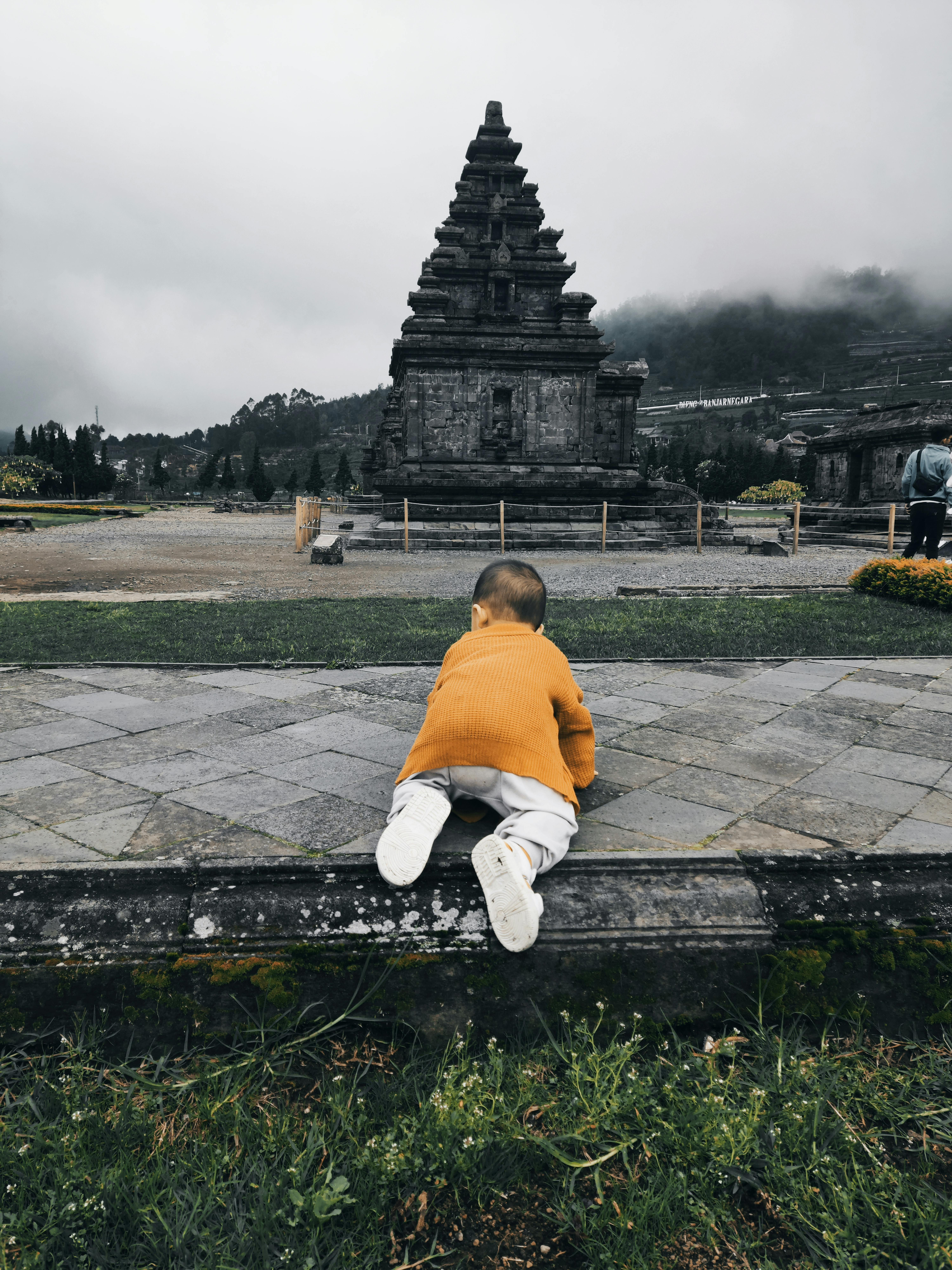 Child Exploring Arjuna Temple, Dieng Plateau · Free Stock Photo