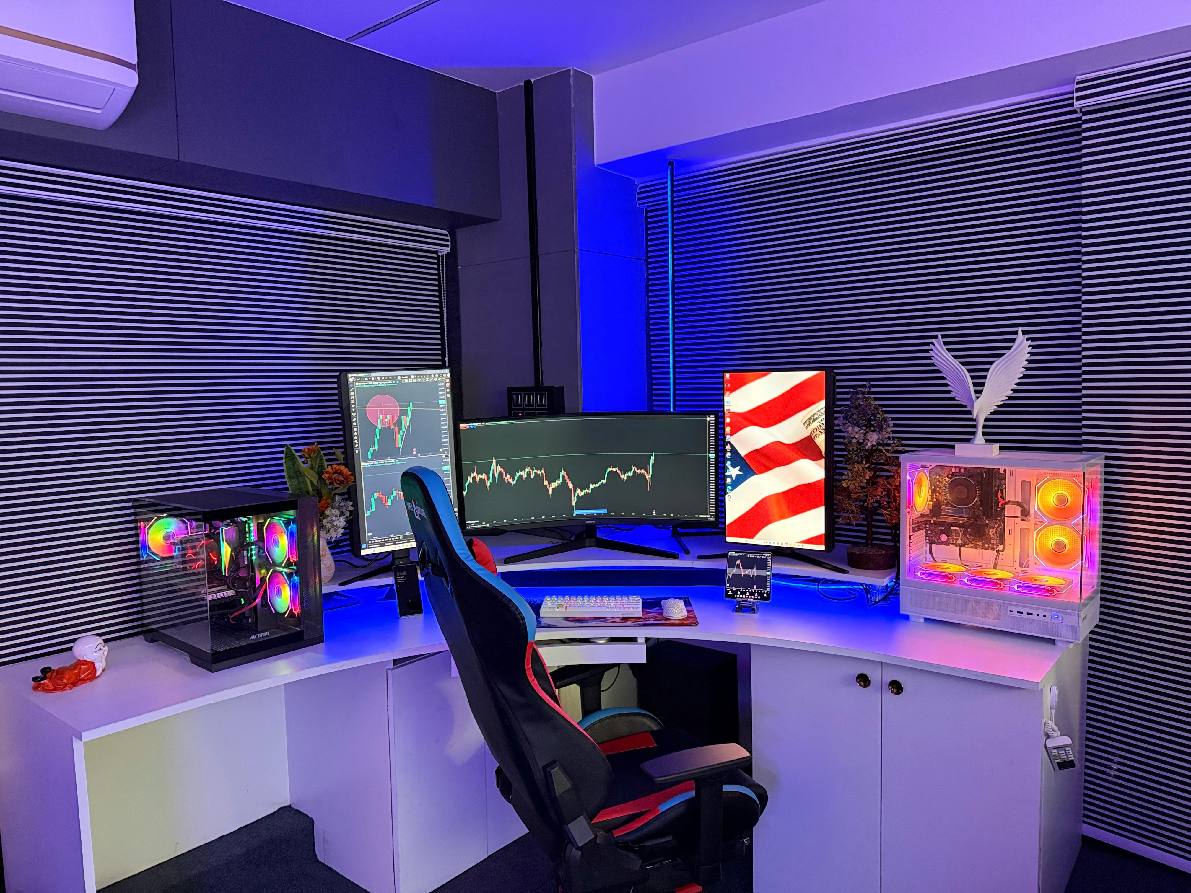 Modern Gaming and Trading Setup with RGB Lighting · Free Stock Photo