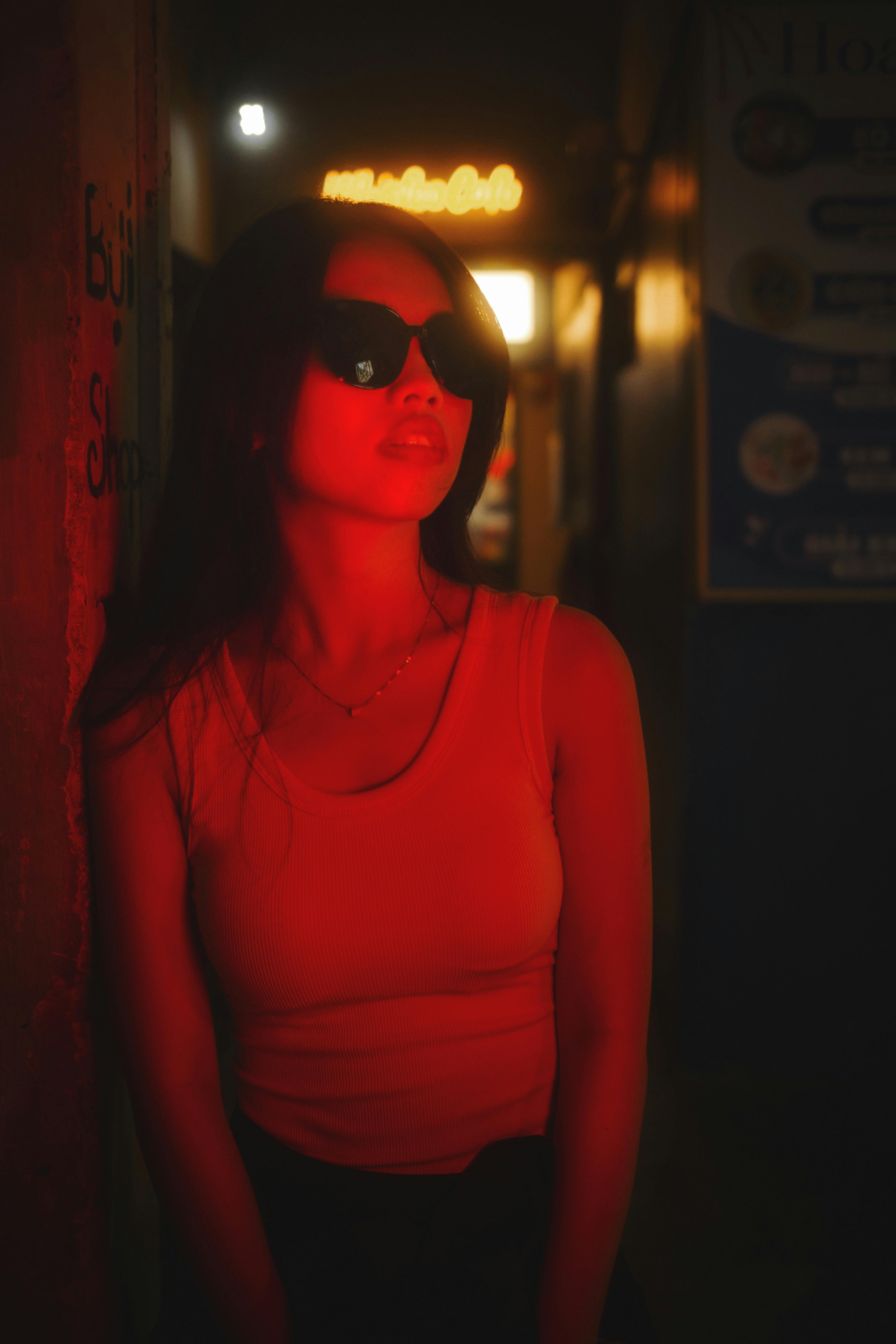 Mysterious Woman in Red Light Alleyway Setting · Free Stock Photo