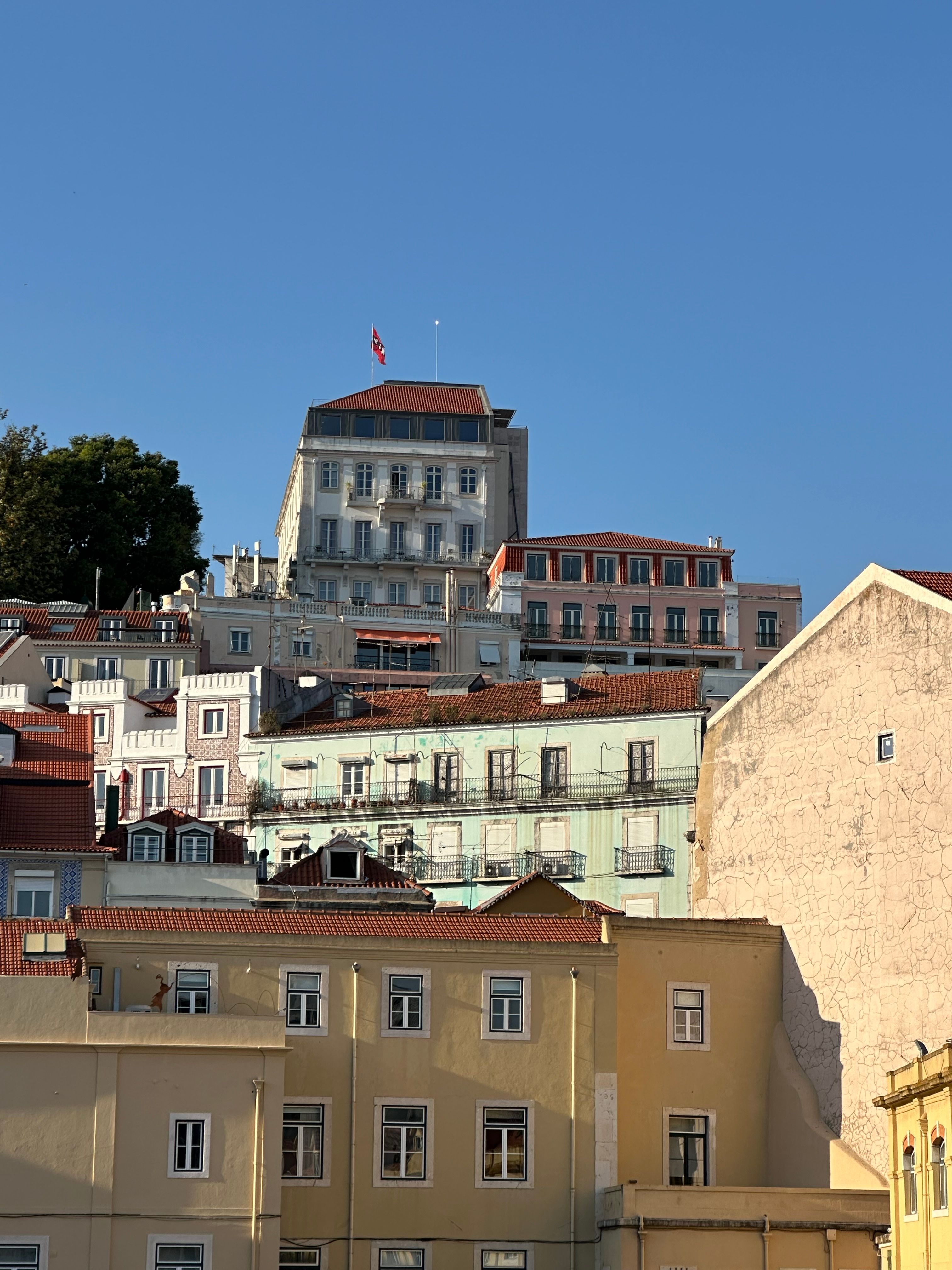 Charming Historic Lisbon Architecture Under Blue Sky · Free Stock Photo