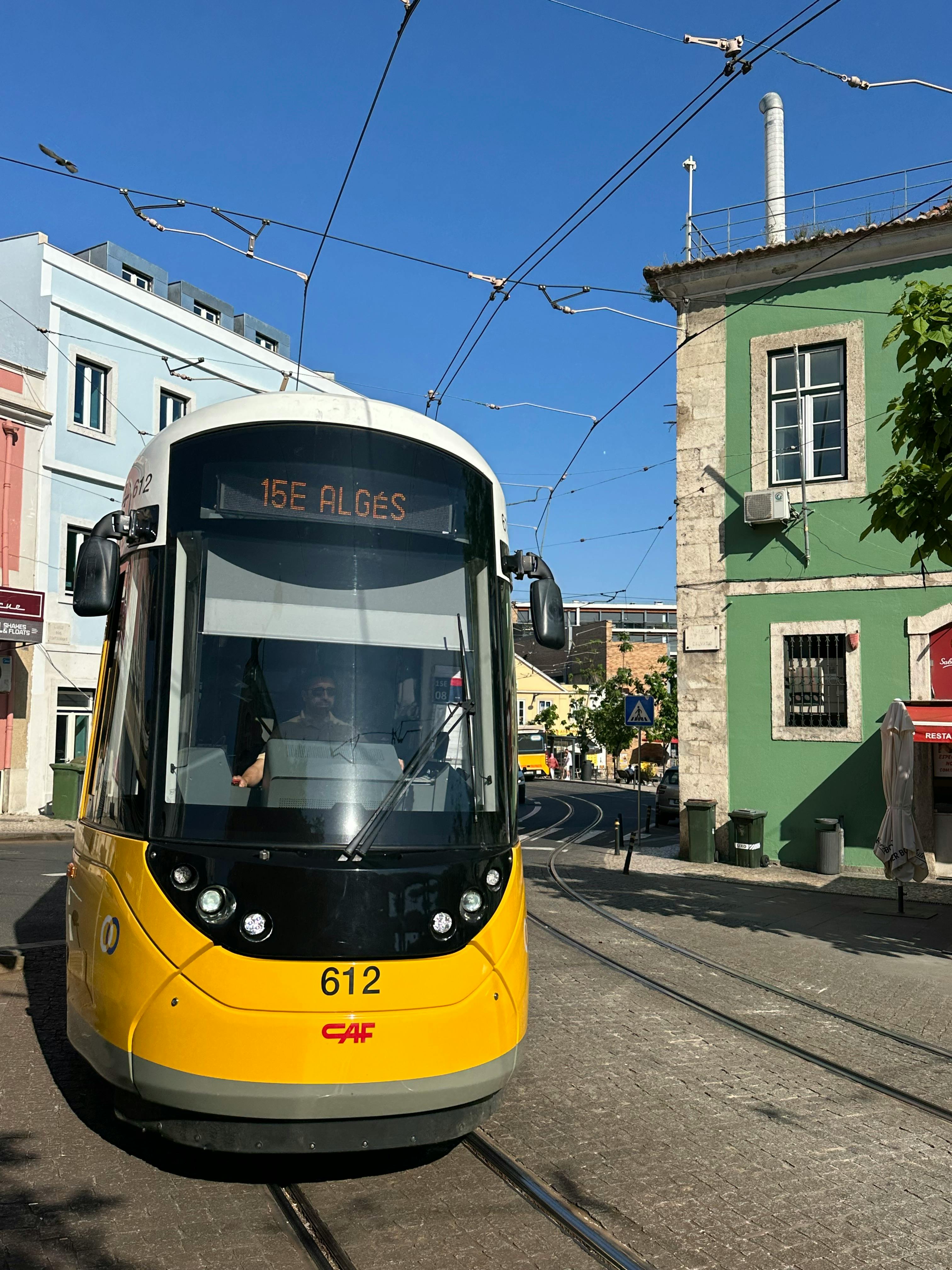 Modern Tram in Lisbon Street on Sunny Day · Free Stock Photo