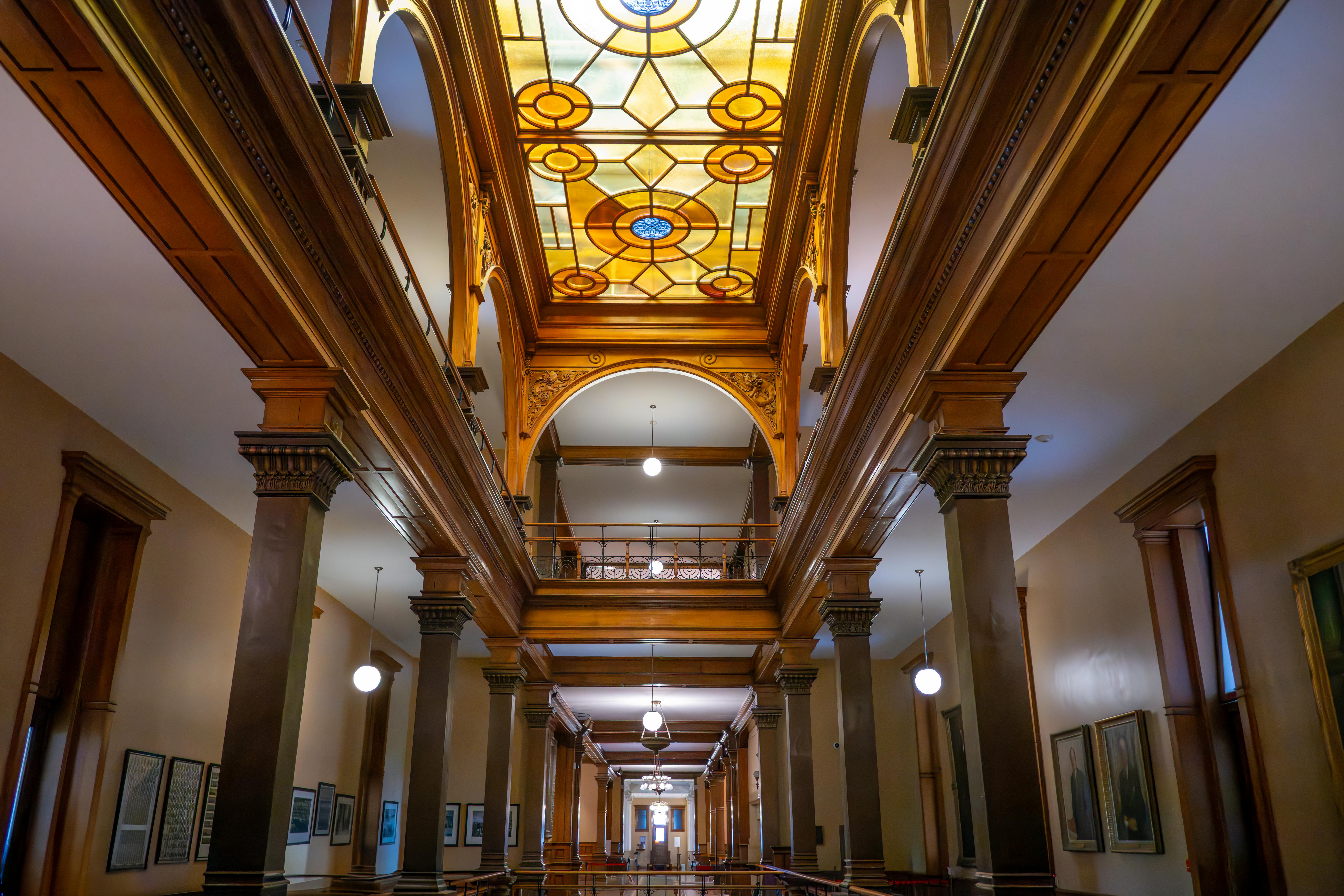 Elegant Historical Building Interior with Stained Glass · Free Stock Photo