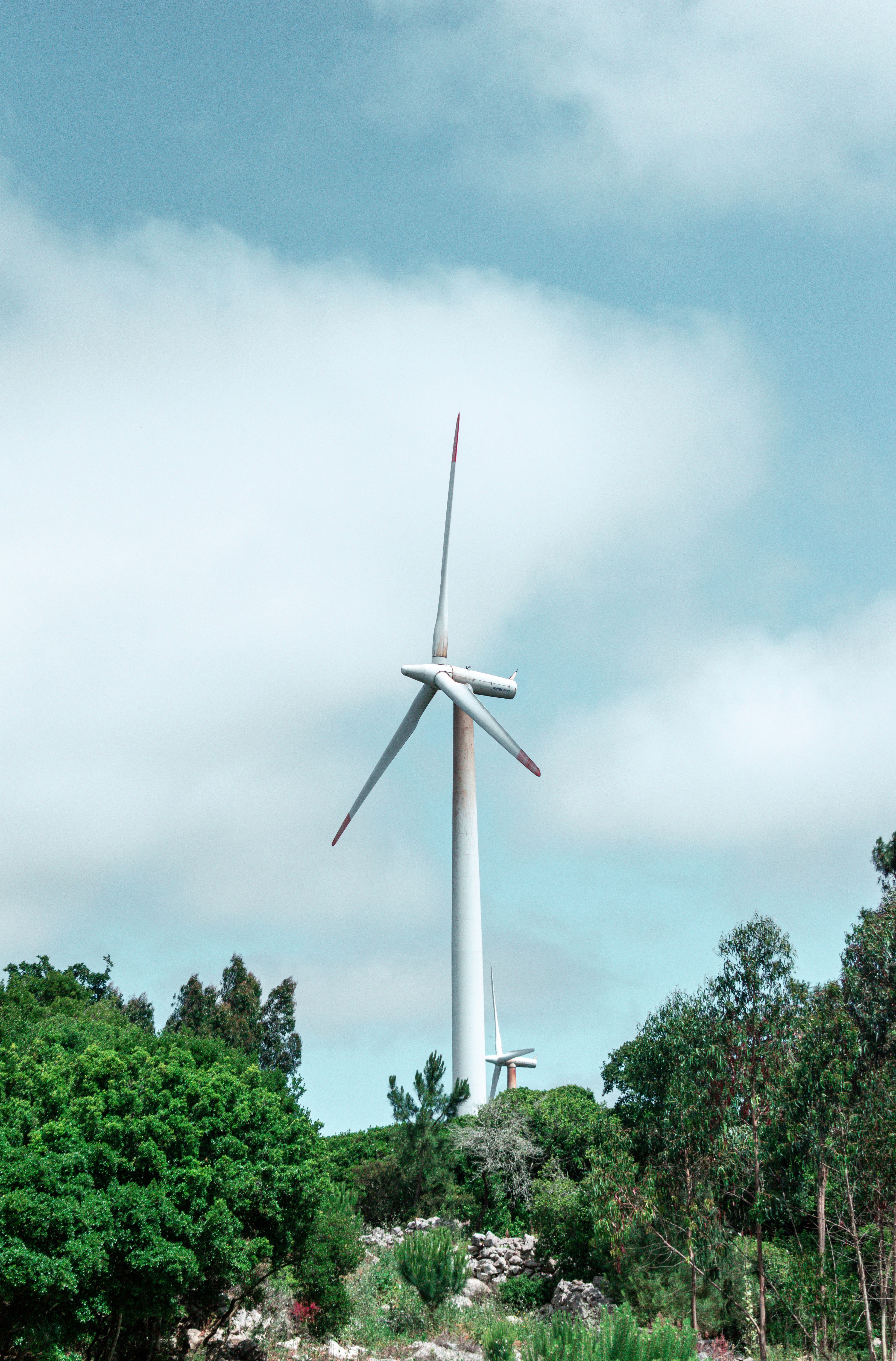 Wind Turbine in Scenic Natural Landscape · Free Stock Photo