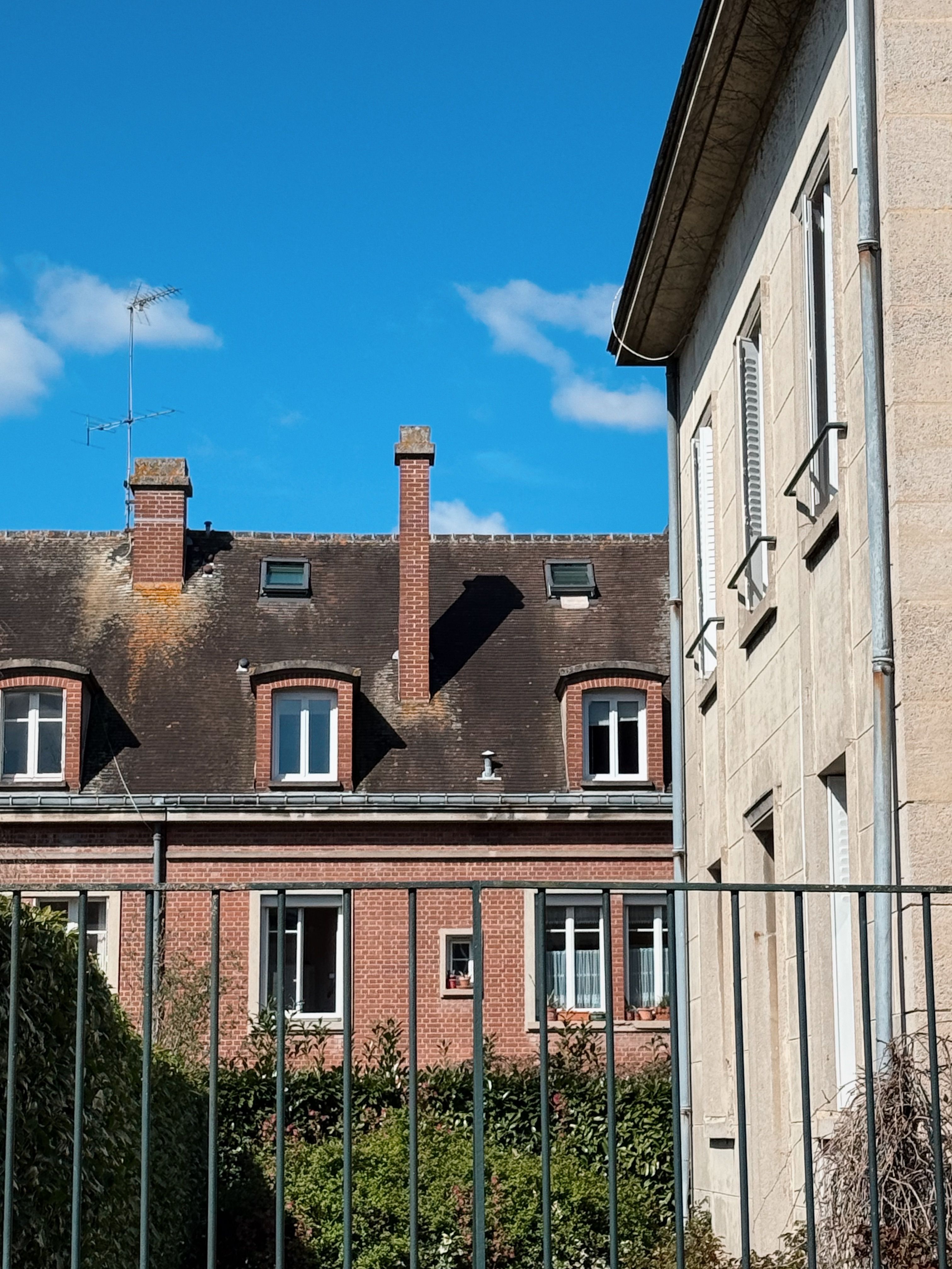 Charming European Brick and Stucco Architecture · Free Stock Photo