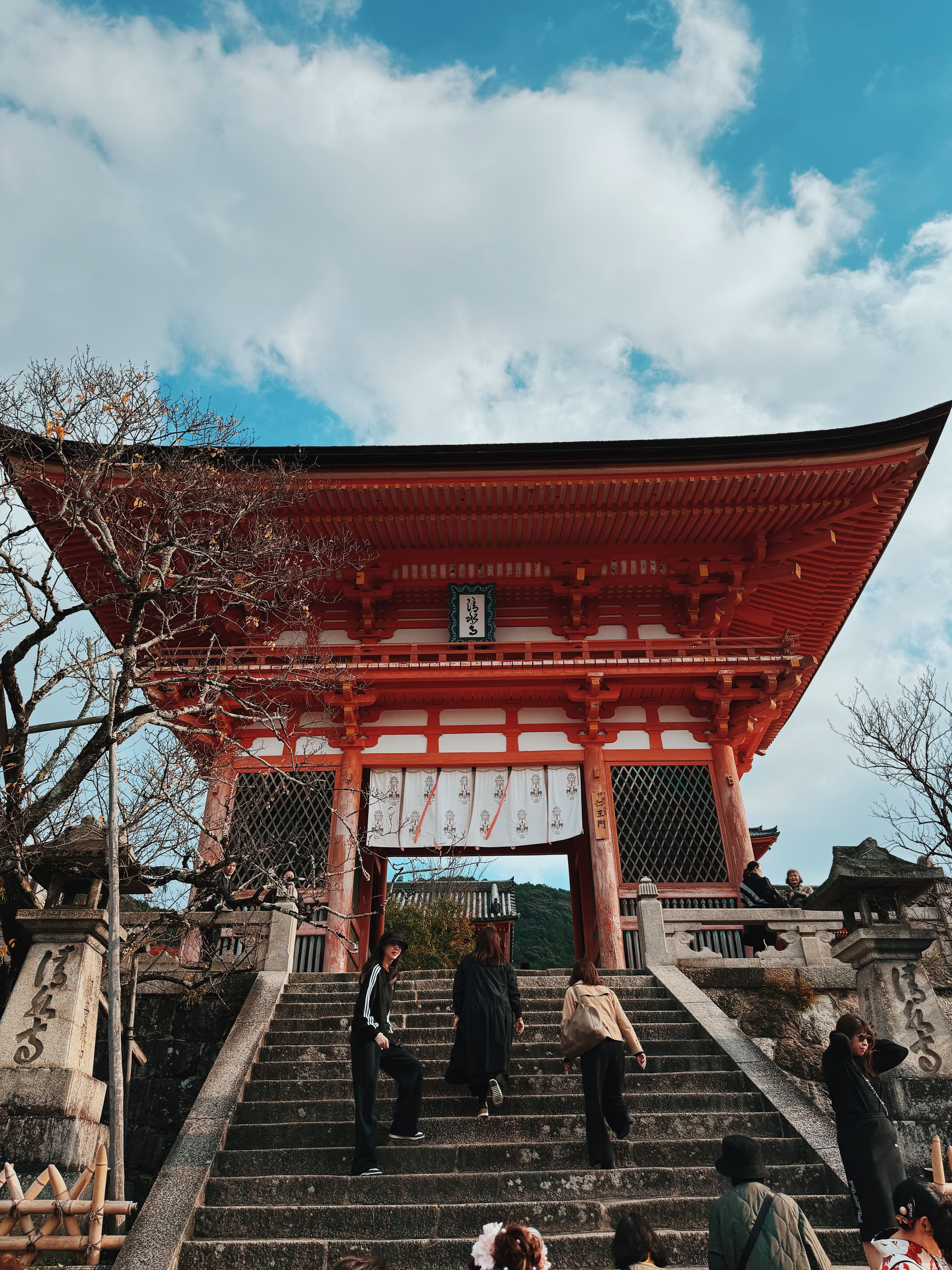 Tourists Climb Steps to Red Temple Gate in Kyoto · Free Stock Photo