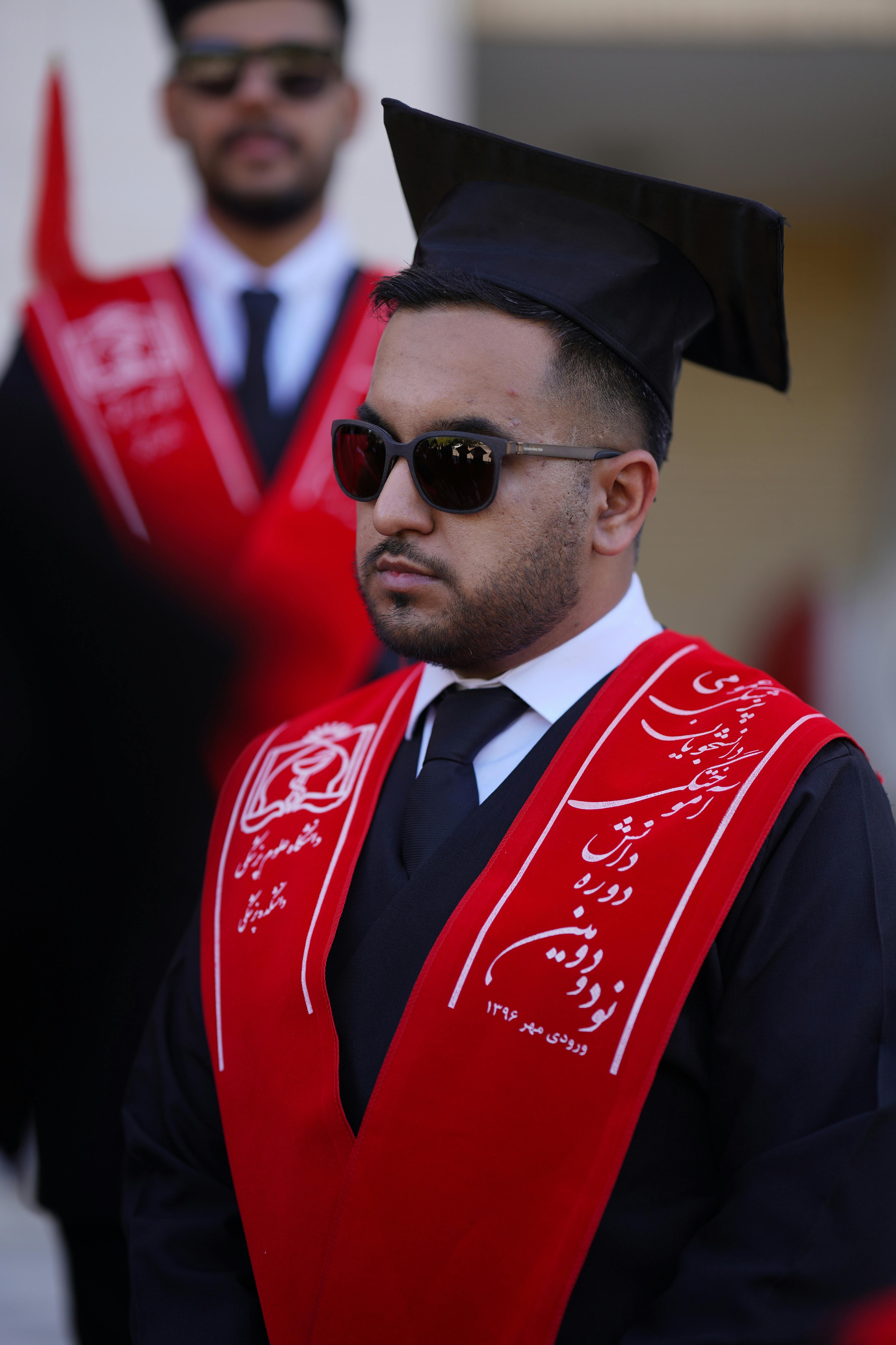 Graduation Ceremony in Iran with Academic Attire · Free Stock Photo