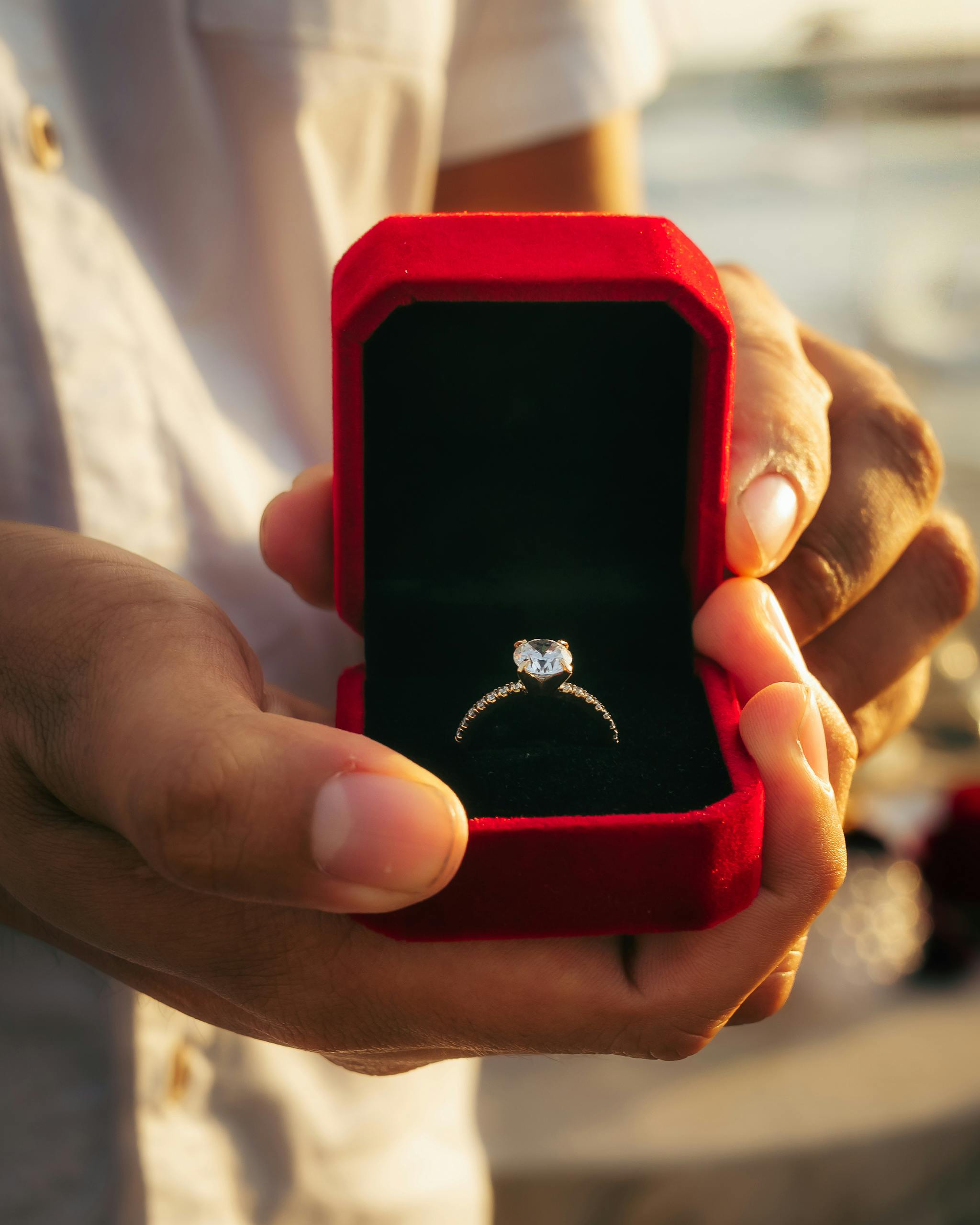 Elegant Diamond Ring in Vibrant Red Box · Free Stock Photo
