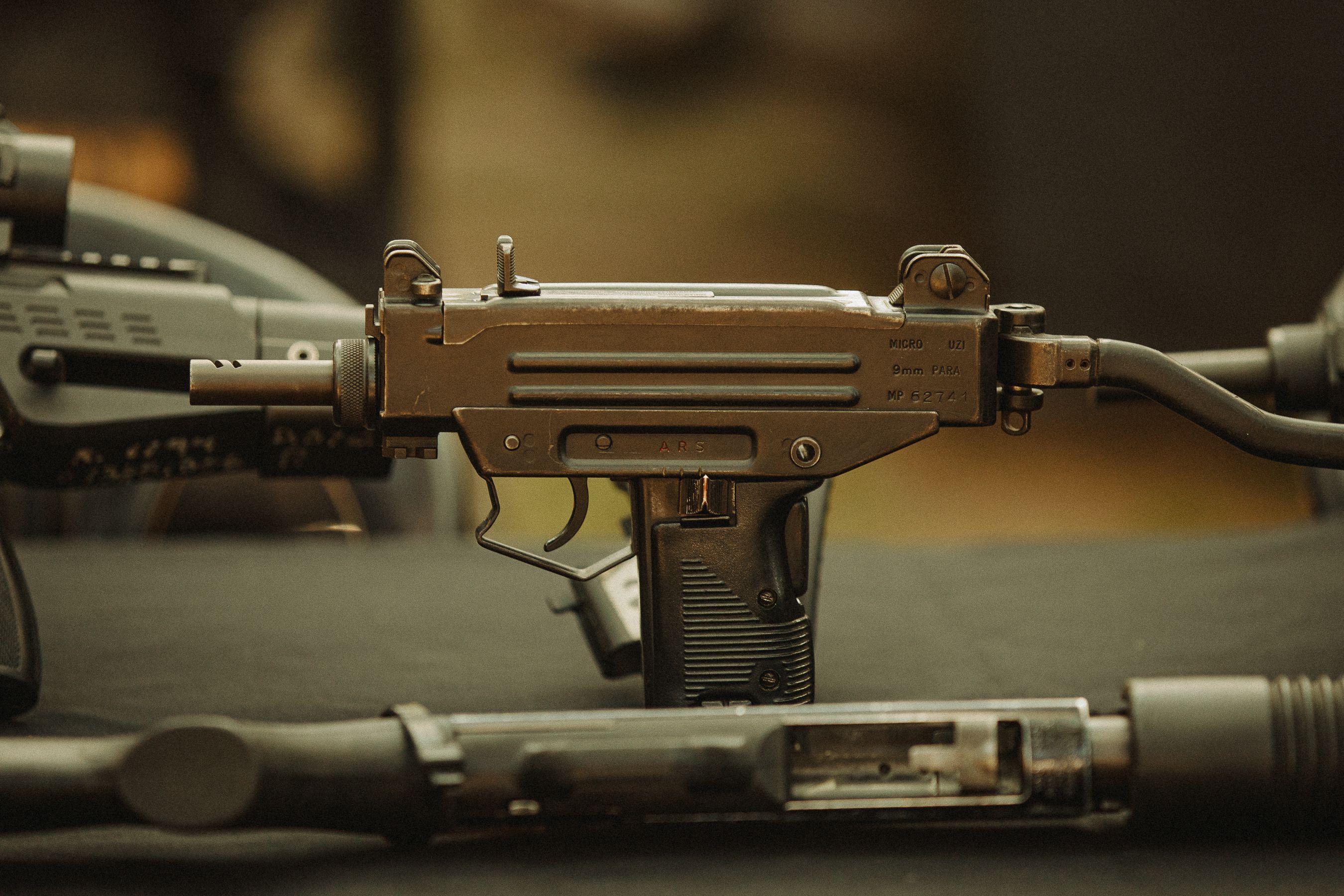 Close-up of Submachine Gun on Display · Free Stock Photo