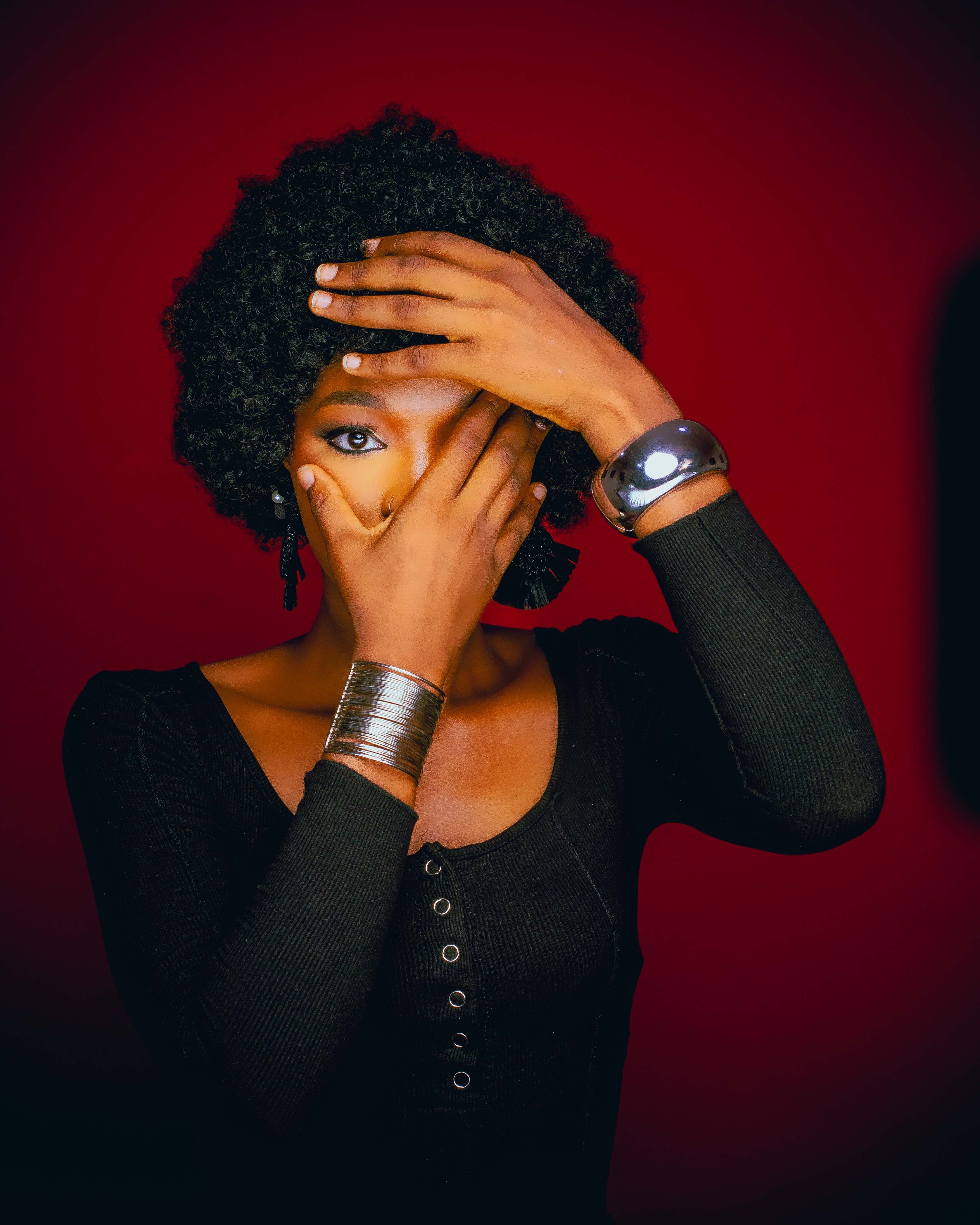 Expressive Portrait with Hands Over Face · Free Stock Photo