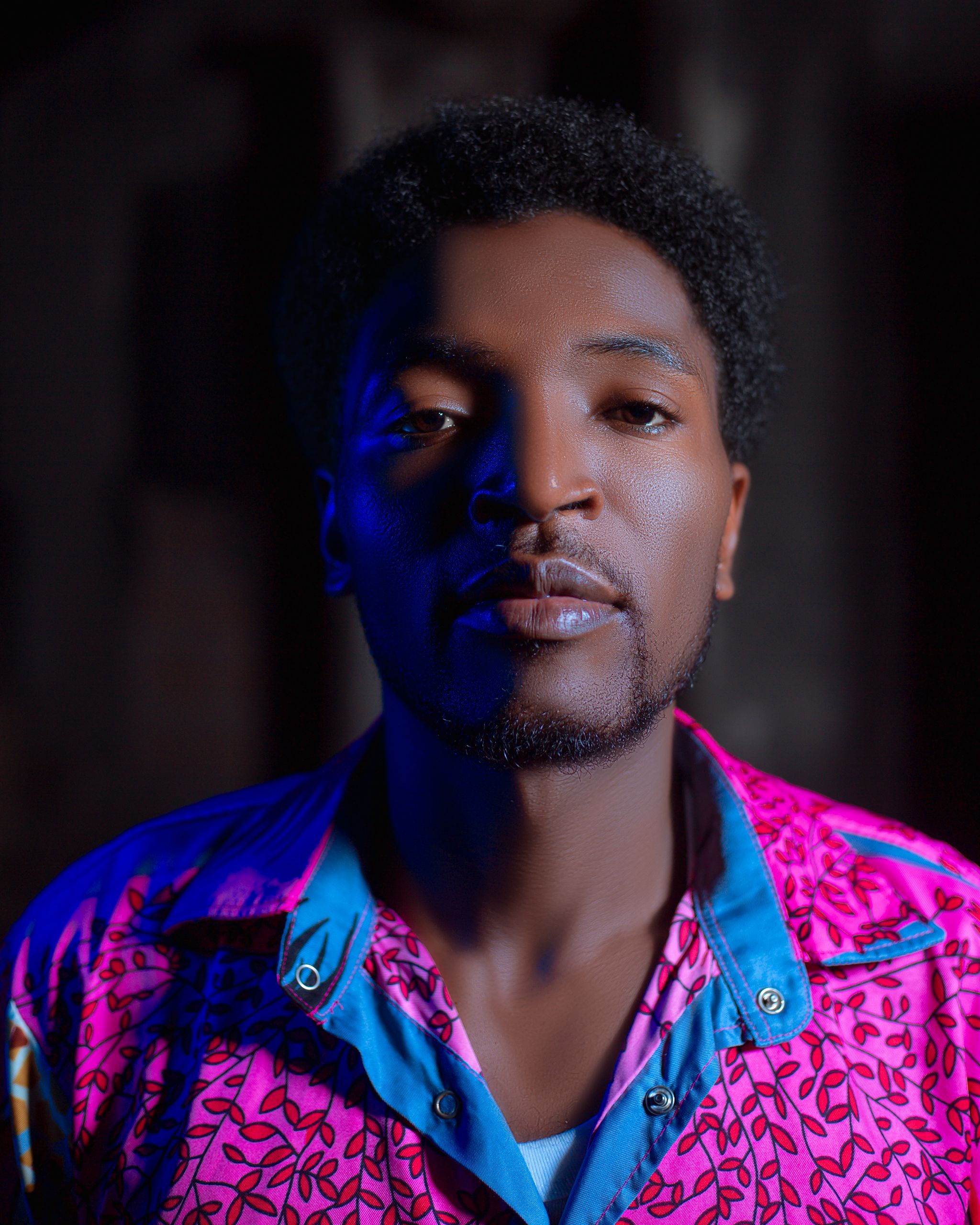 Vibrant Portrait of a Man in Colorful Attire · Free Stock Photo