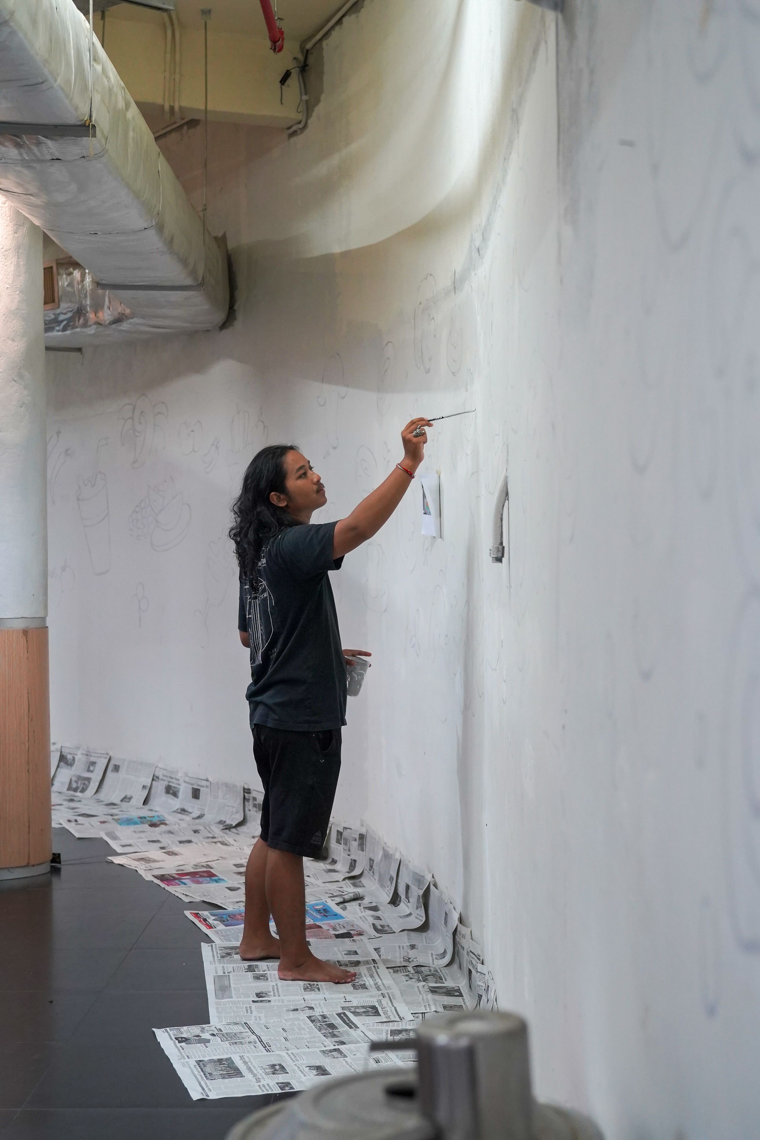 Balinese Artist Creating Indoor Mural in Bali · Free Stock Photo