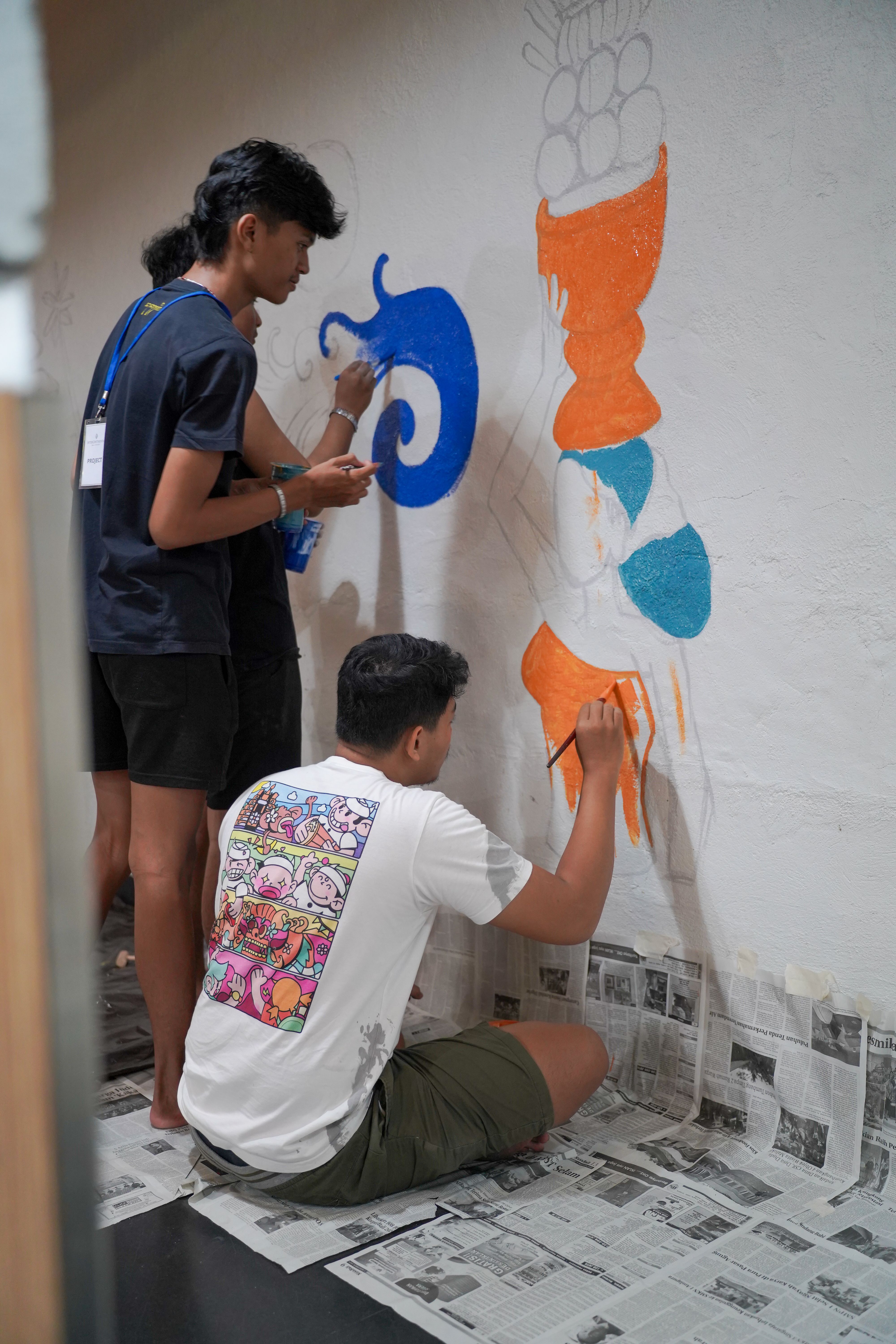 Group of Artists Creating Vibrant Mural in Bali · Free Stock Photo