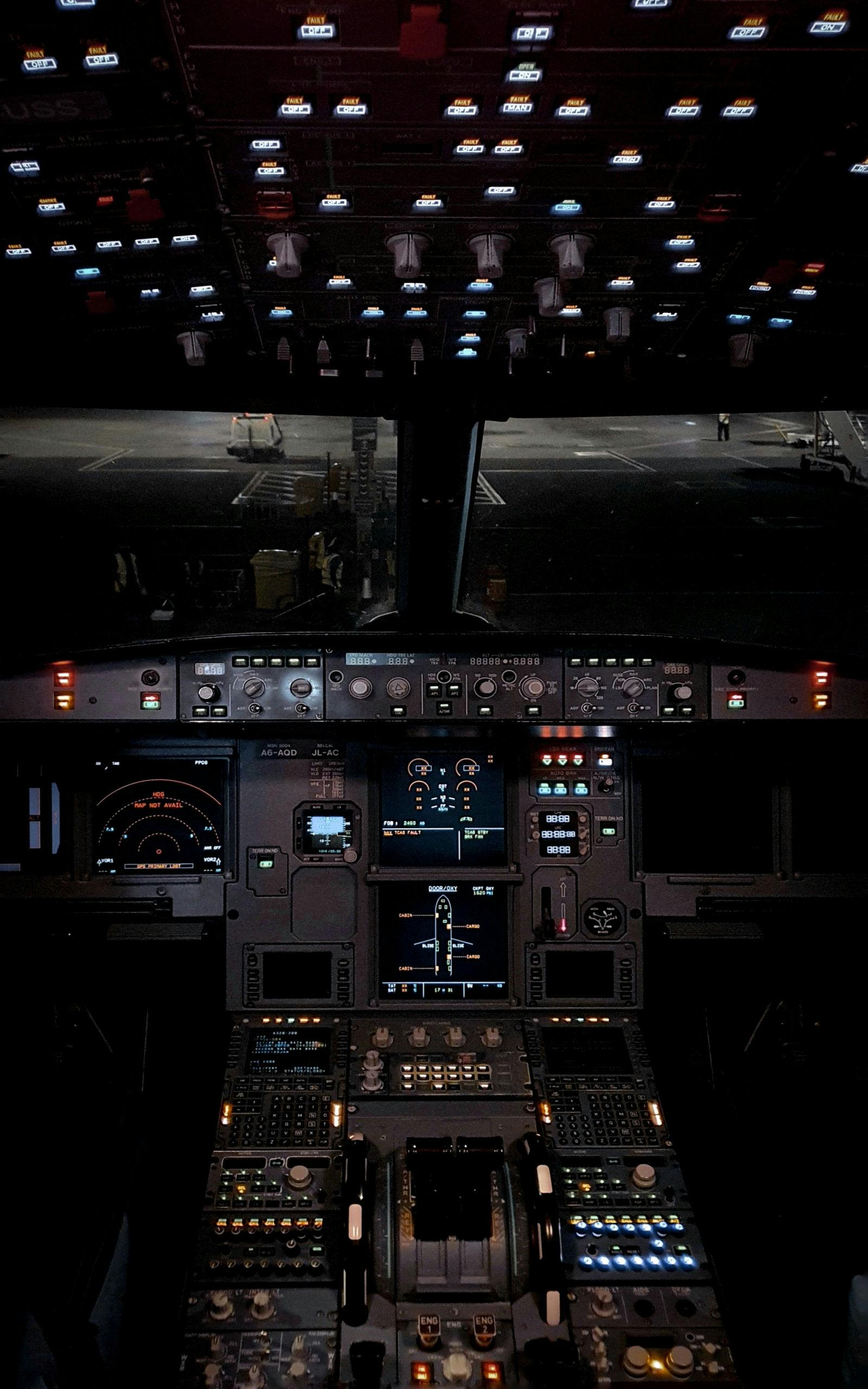 Airplane Cockpit with Instrument Panel at Night · Free Stock Photo