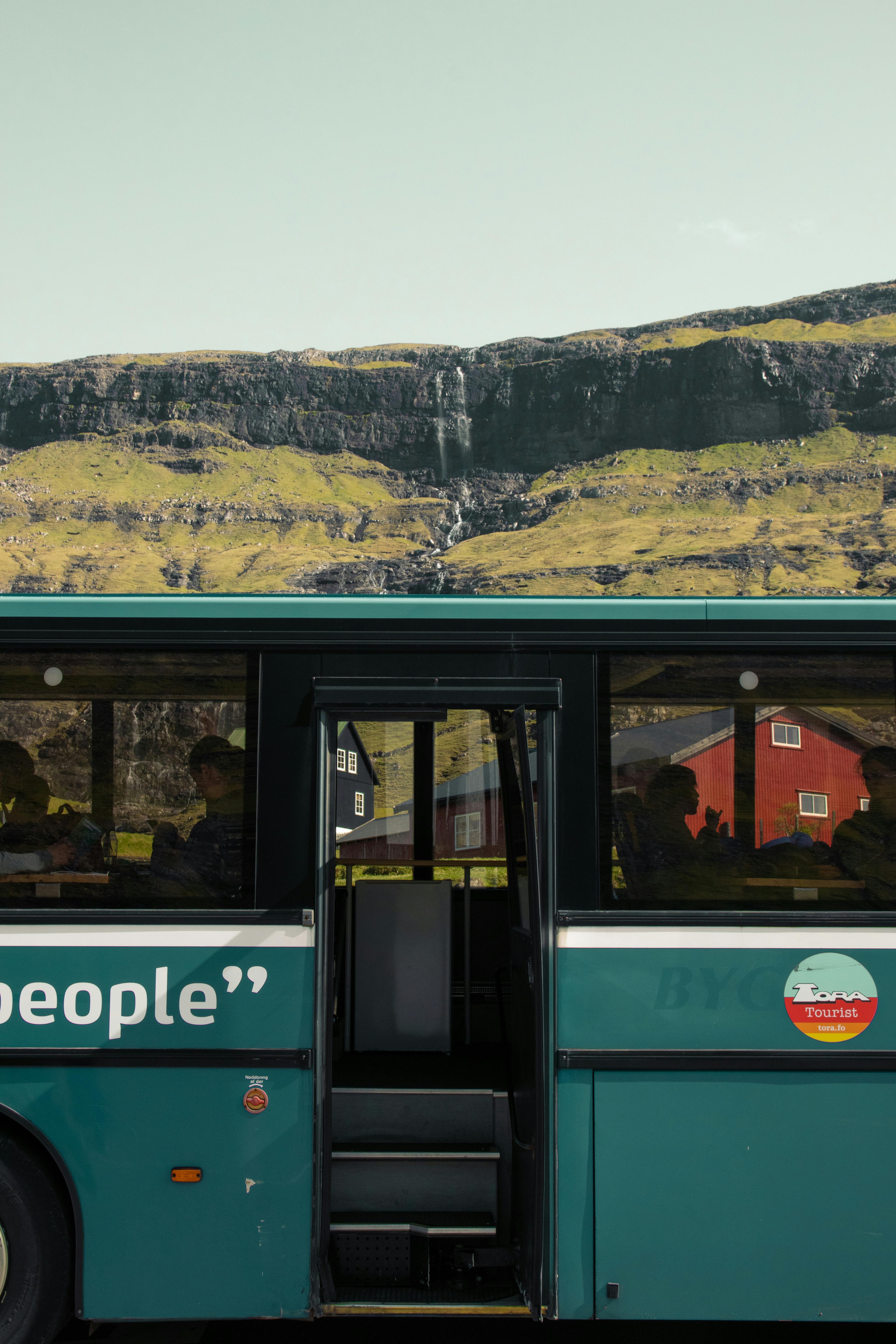 Scenic Faroe Islands Bus Tour with Waterfall · Free Stock Photo