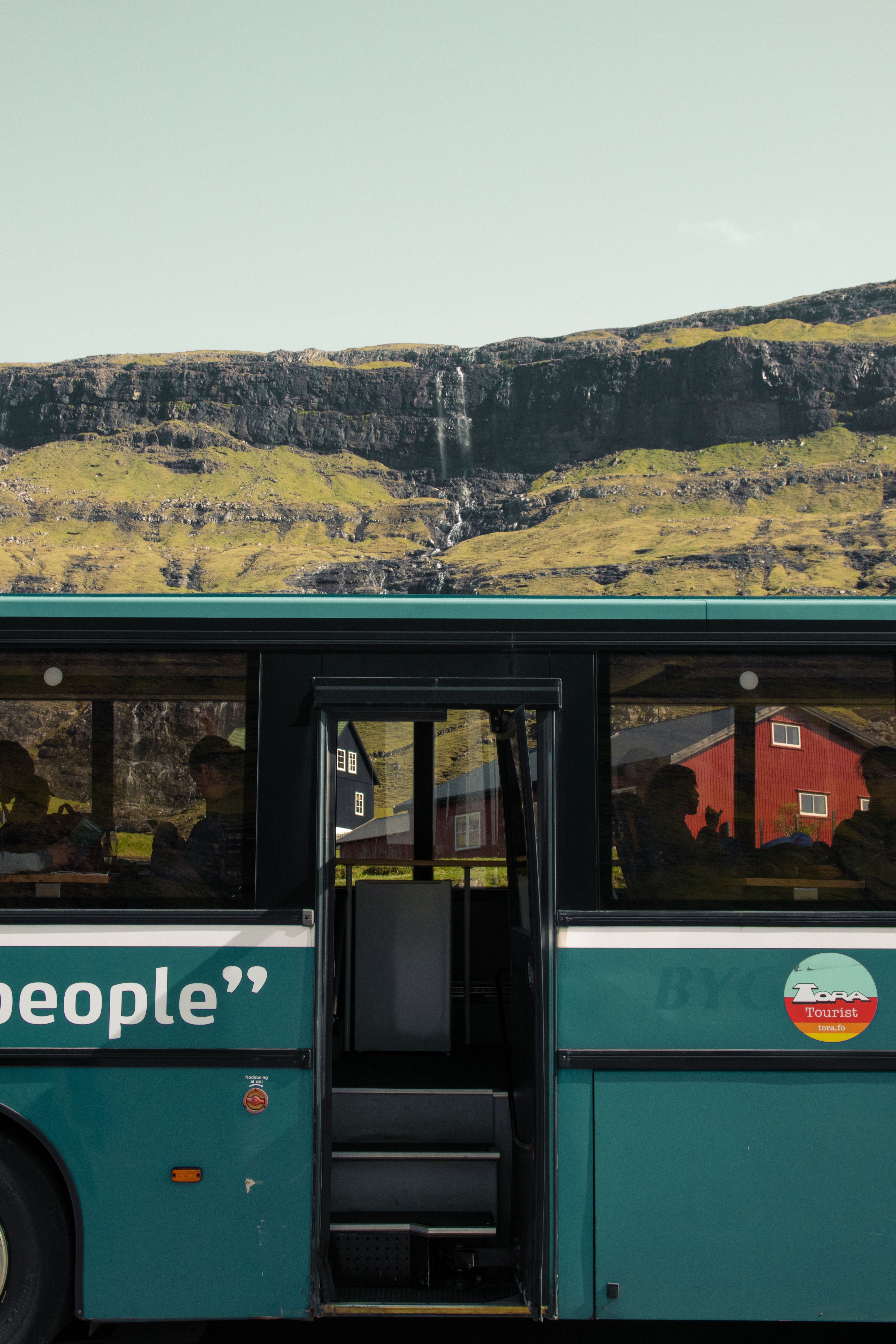 Scenic Faroe Islands Bus Tour with Waterfall · Free Stock Photo