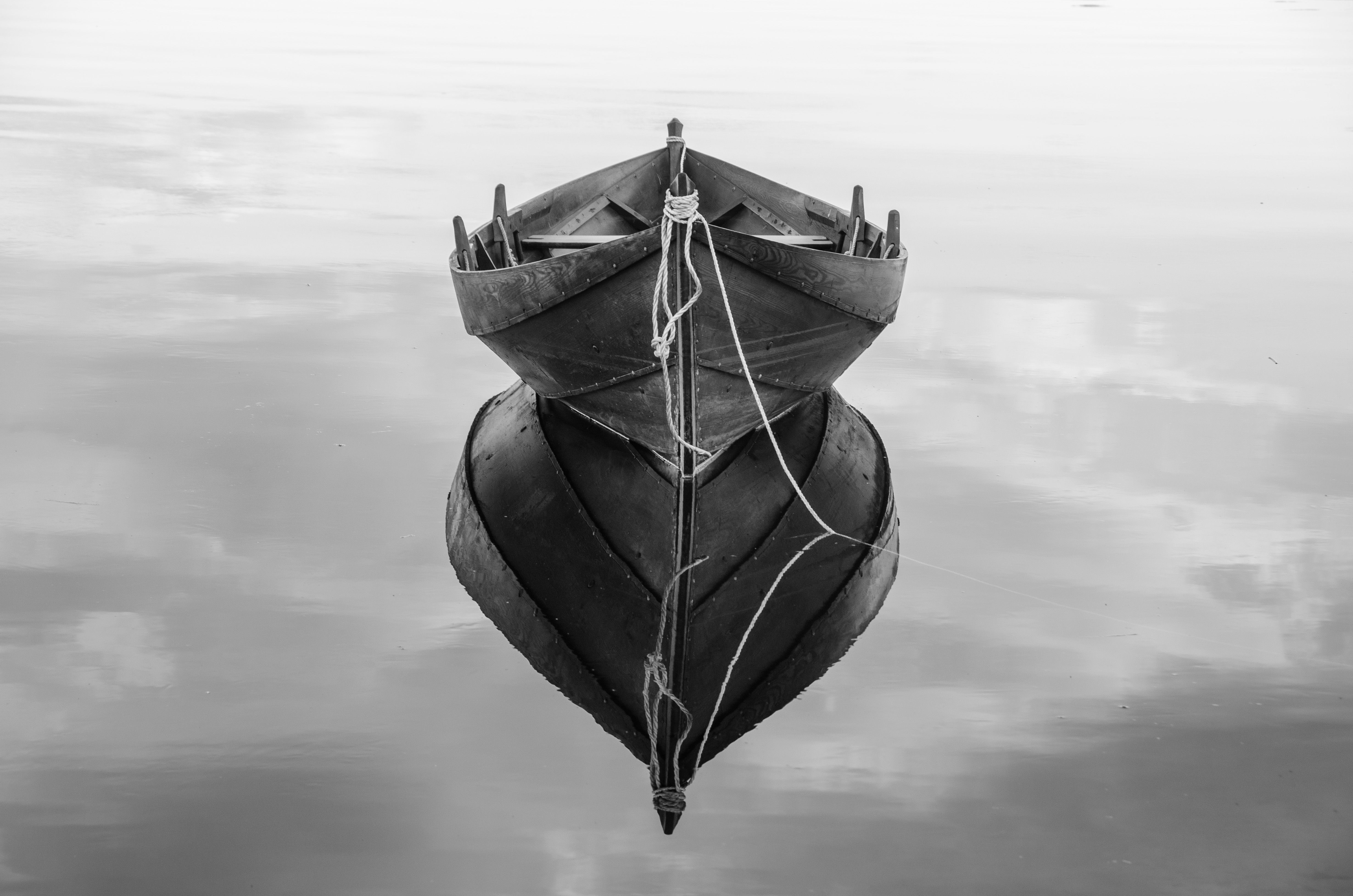 Black and White Symmetrical Reflection of Boat · Free Stock Photo