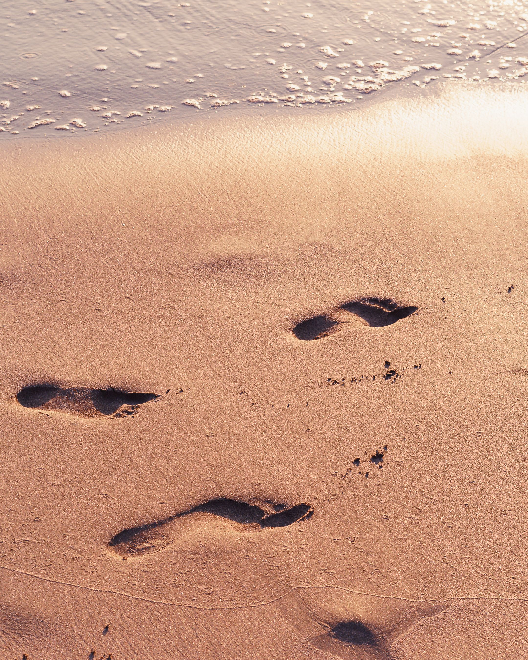 Footprints on Beach Sand · Free Stock Photo