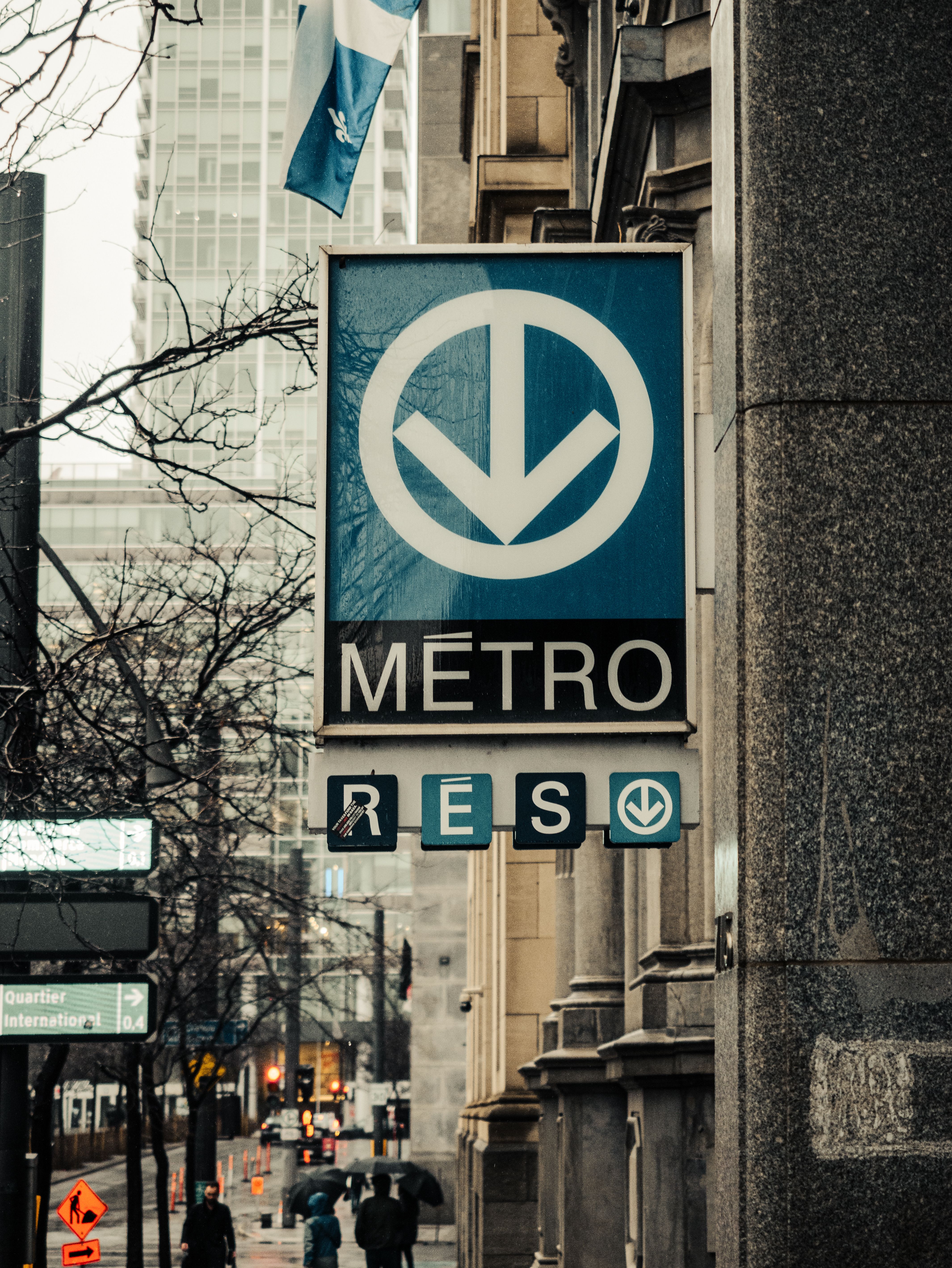 Montreal Metro Sign in Downtown Street Scene · Free Stock Photo