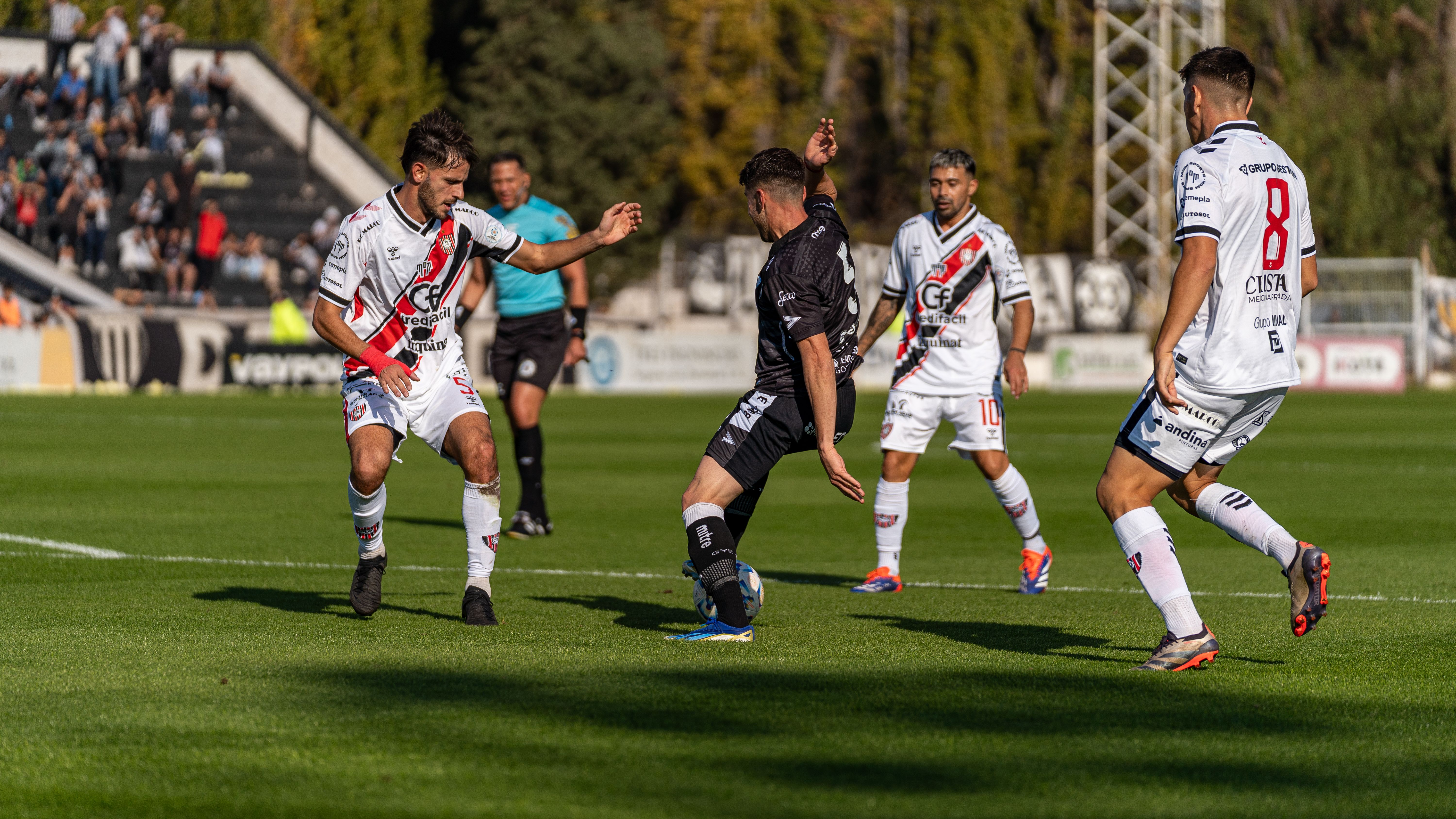 Action-Packed Soccer Match Between Competing Teams · Free Stock Photo