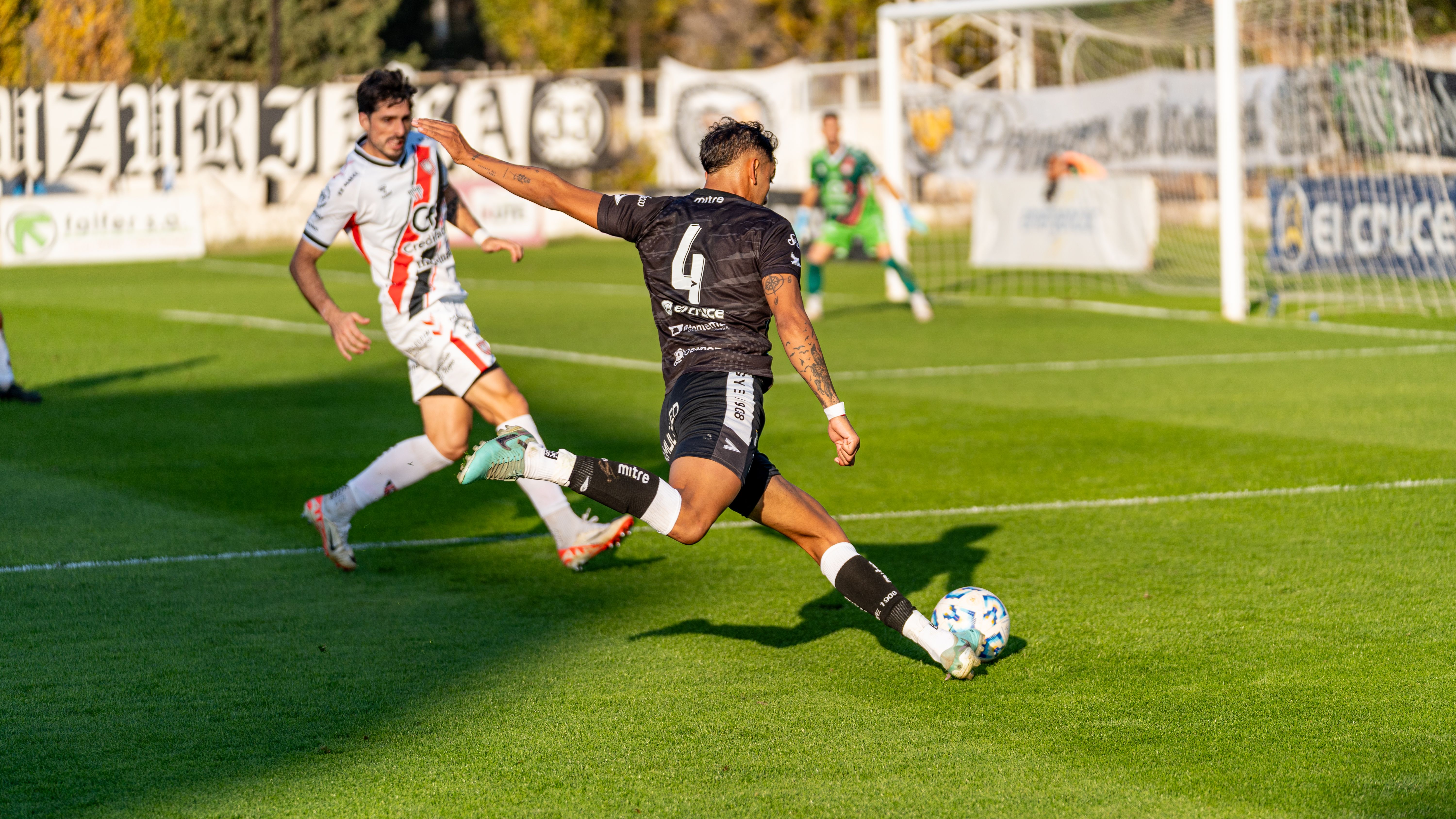Intense Soccer Match with Dynamic Players in Action · Free Stock Photo