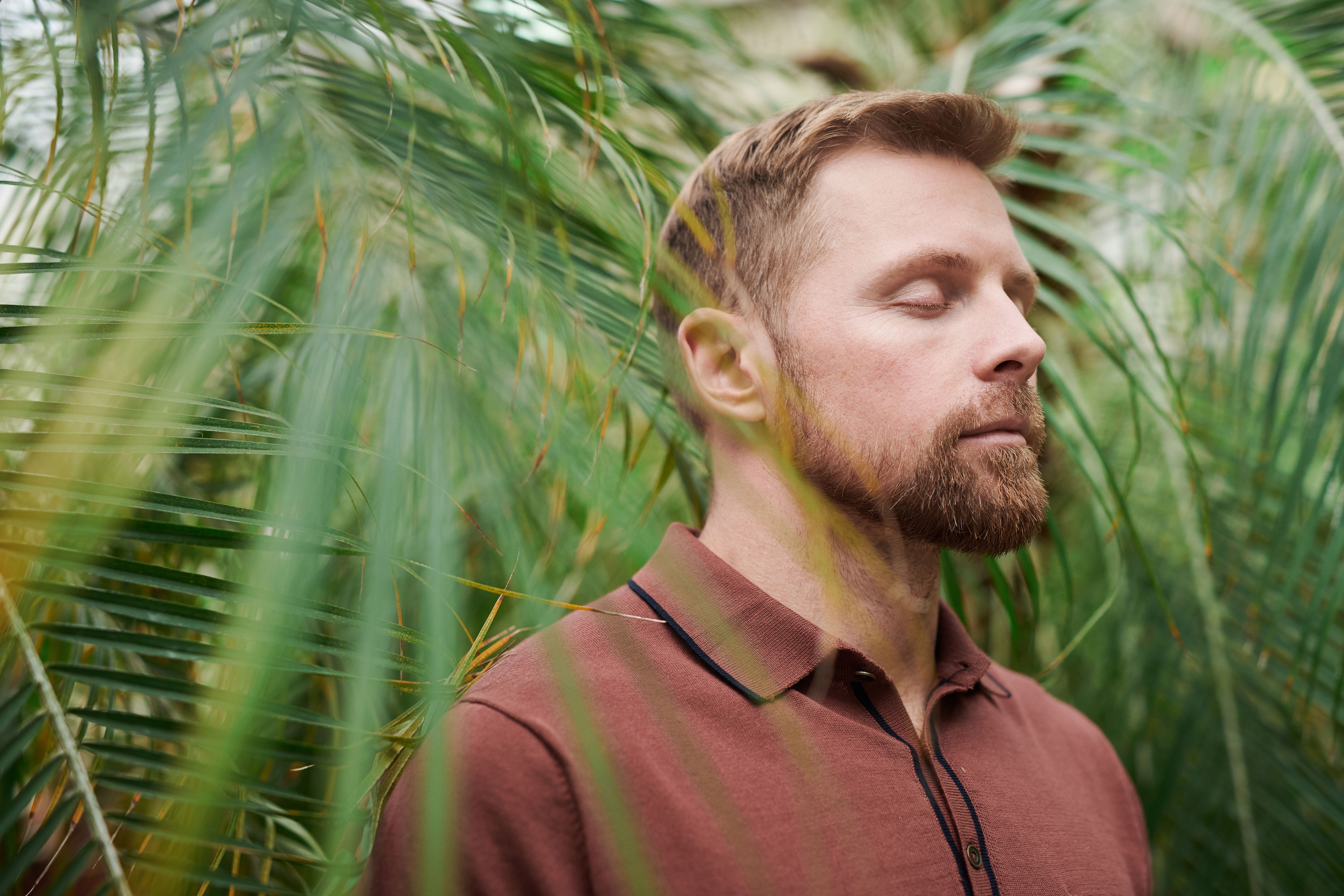 Selective Focus Photo of Man Closing His Eyes · Free Stock Photo