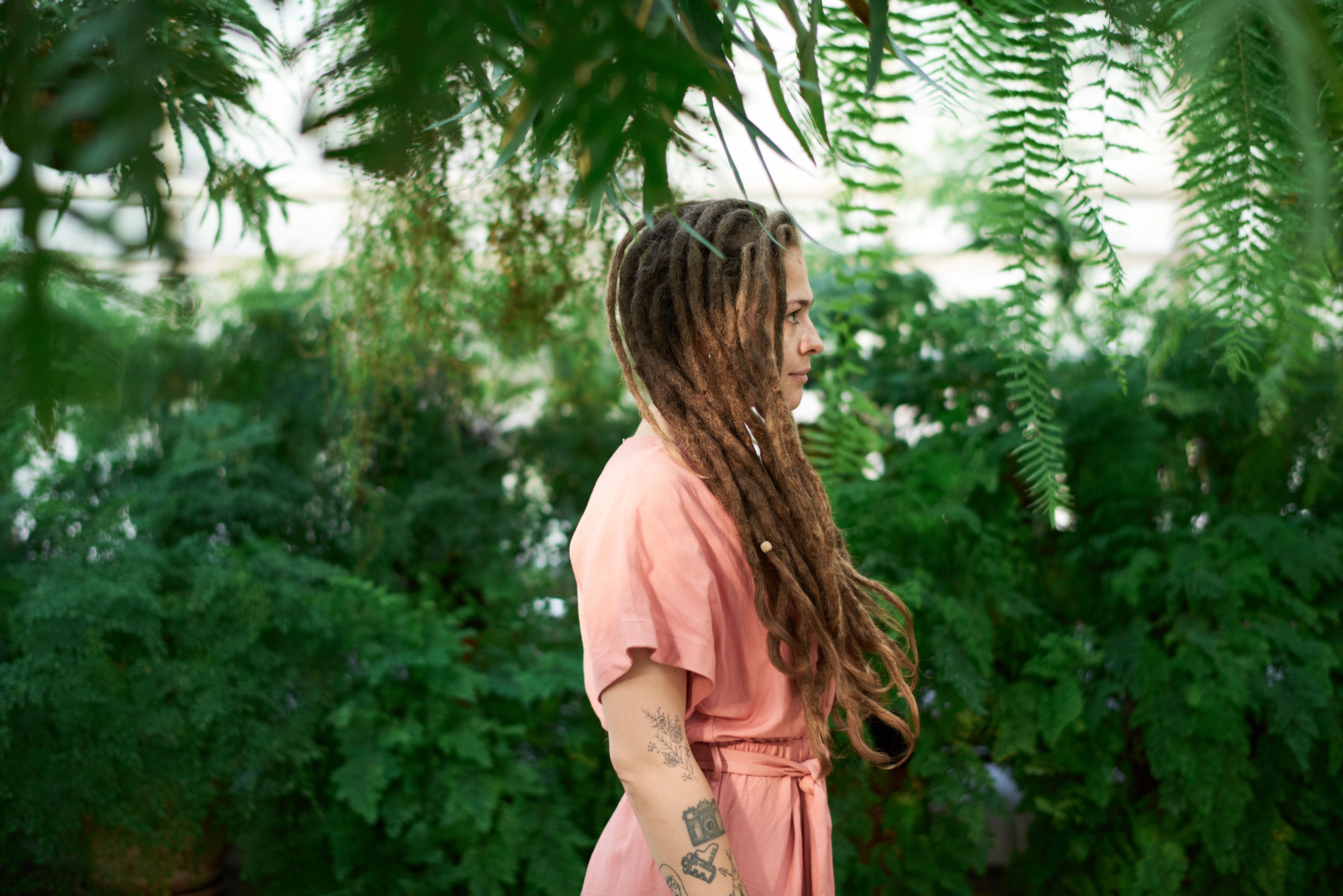 Woman in Peach-colored Dress by Plants · Free Stock Photo