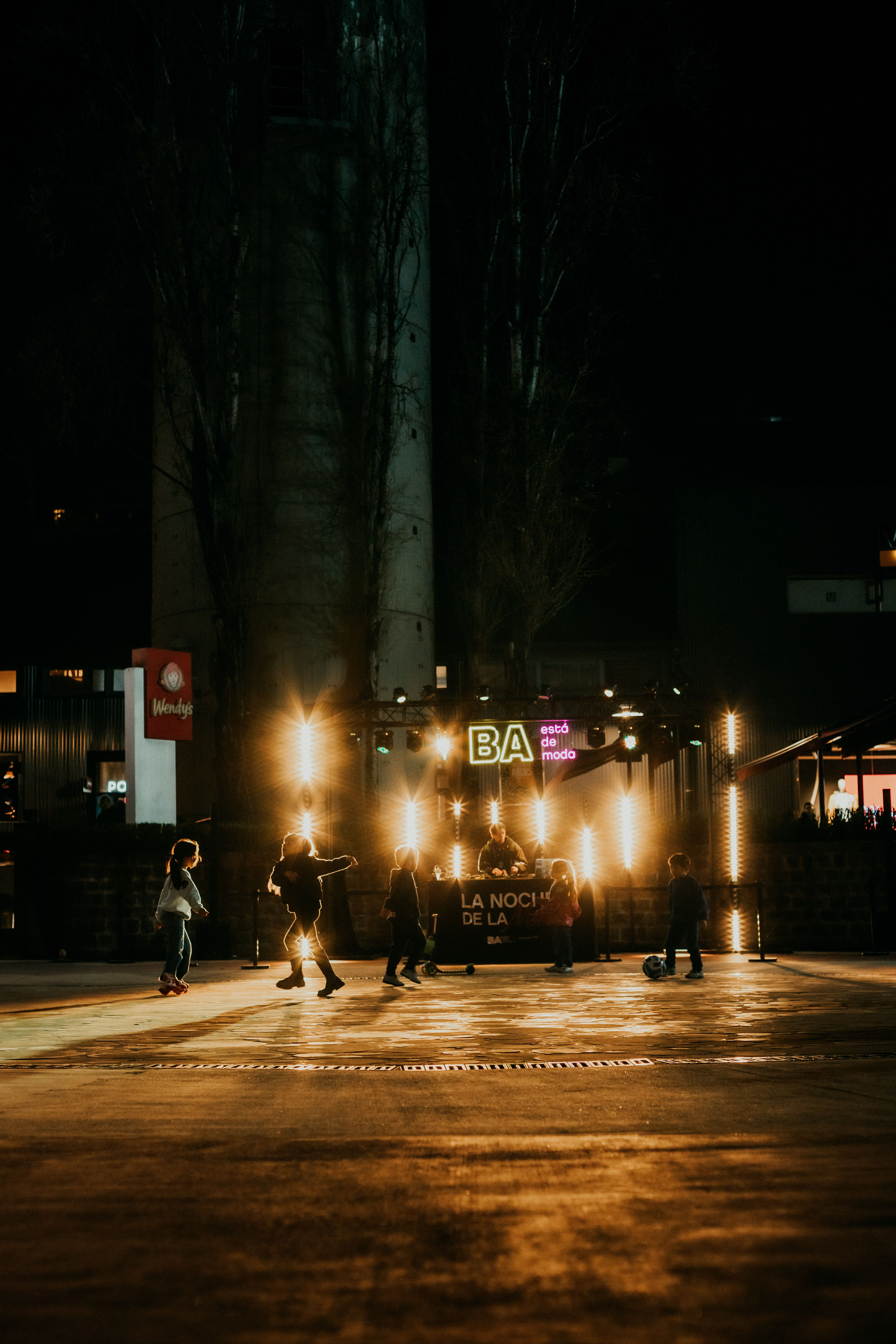 Nighttime Street Performance with Audience · Free Stock Photo