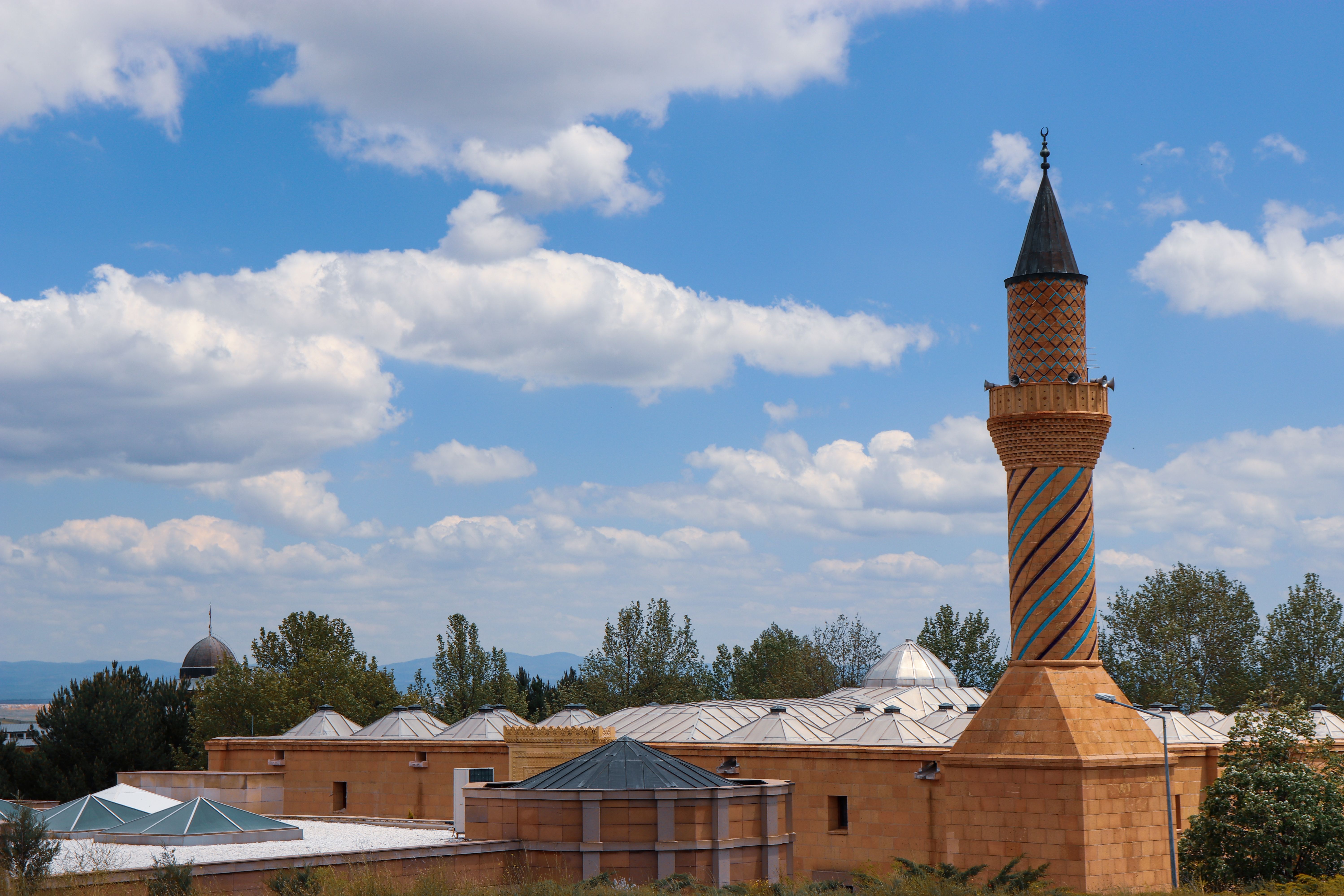 Beautiful Mosque Minaret Against Blue Sky · Free Stock Photo