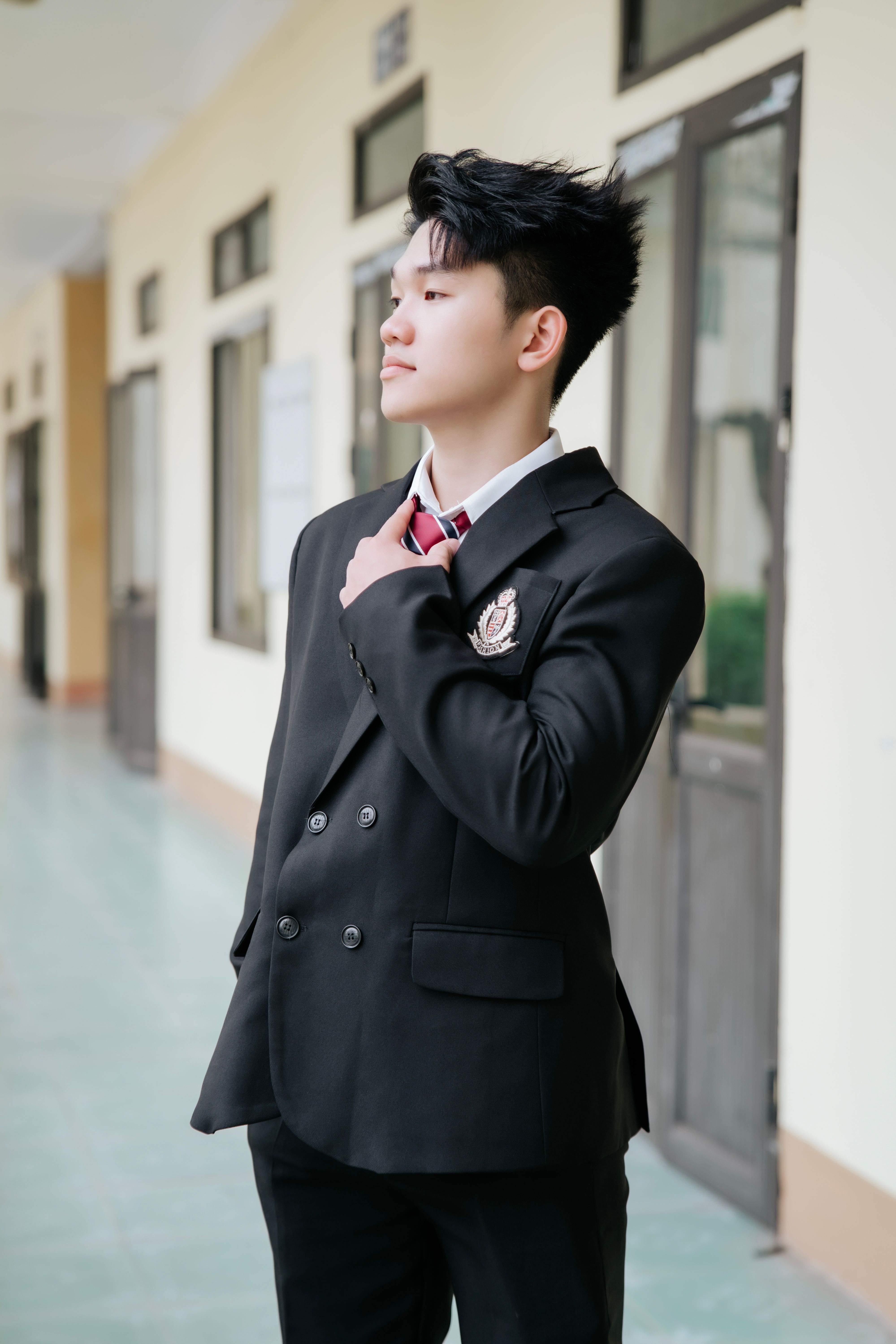 Young Student in Formal School Uniform Indoors · Free Stock Photo