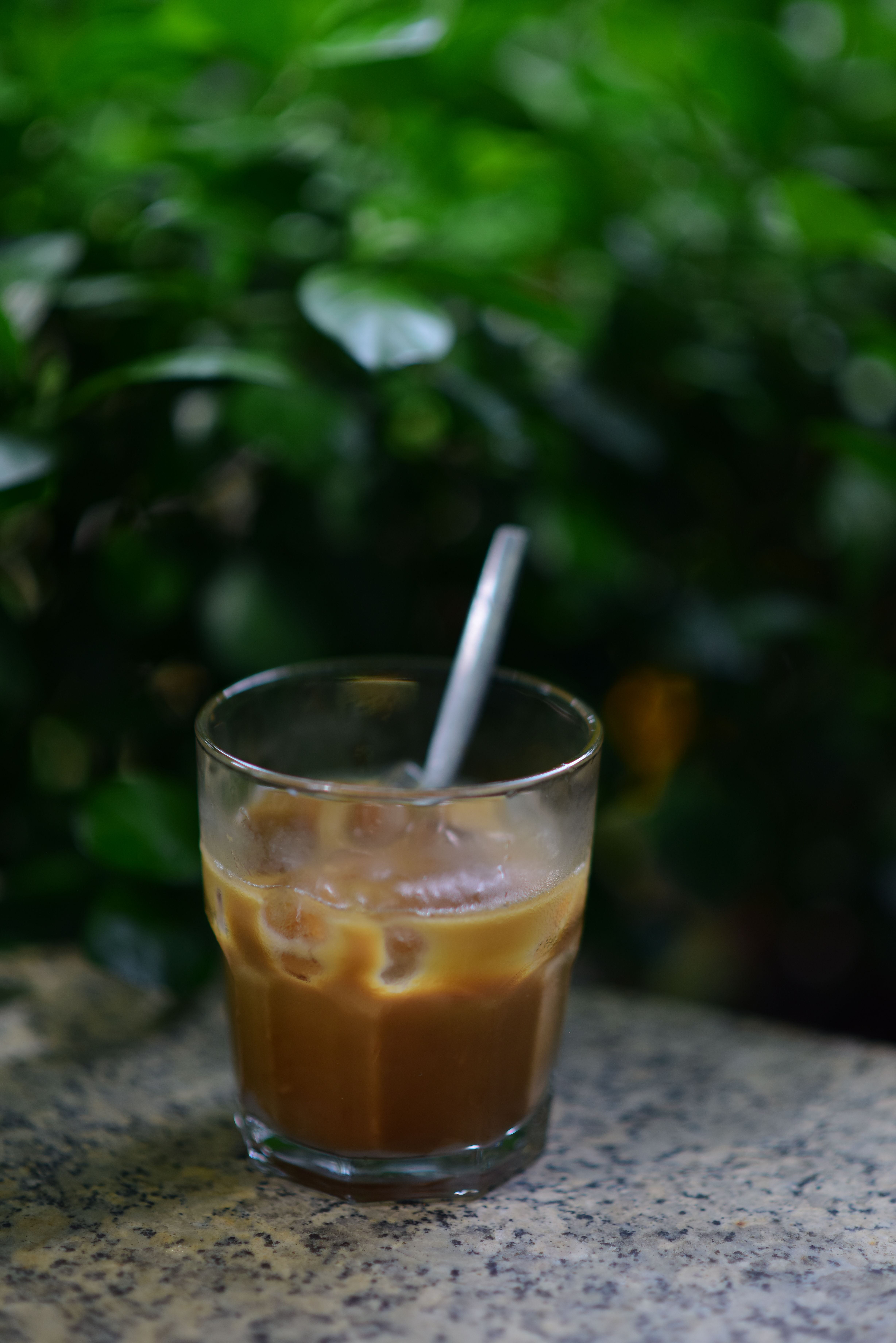 Chilled Iced Coffee on Stone Table Outdoors · Free Stock Photo