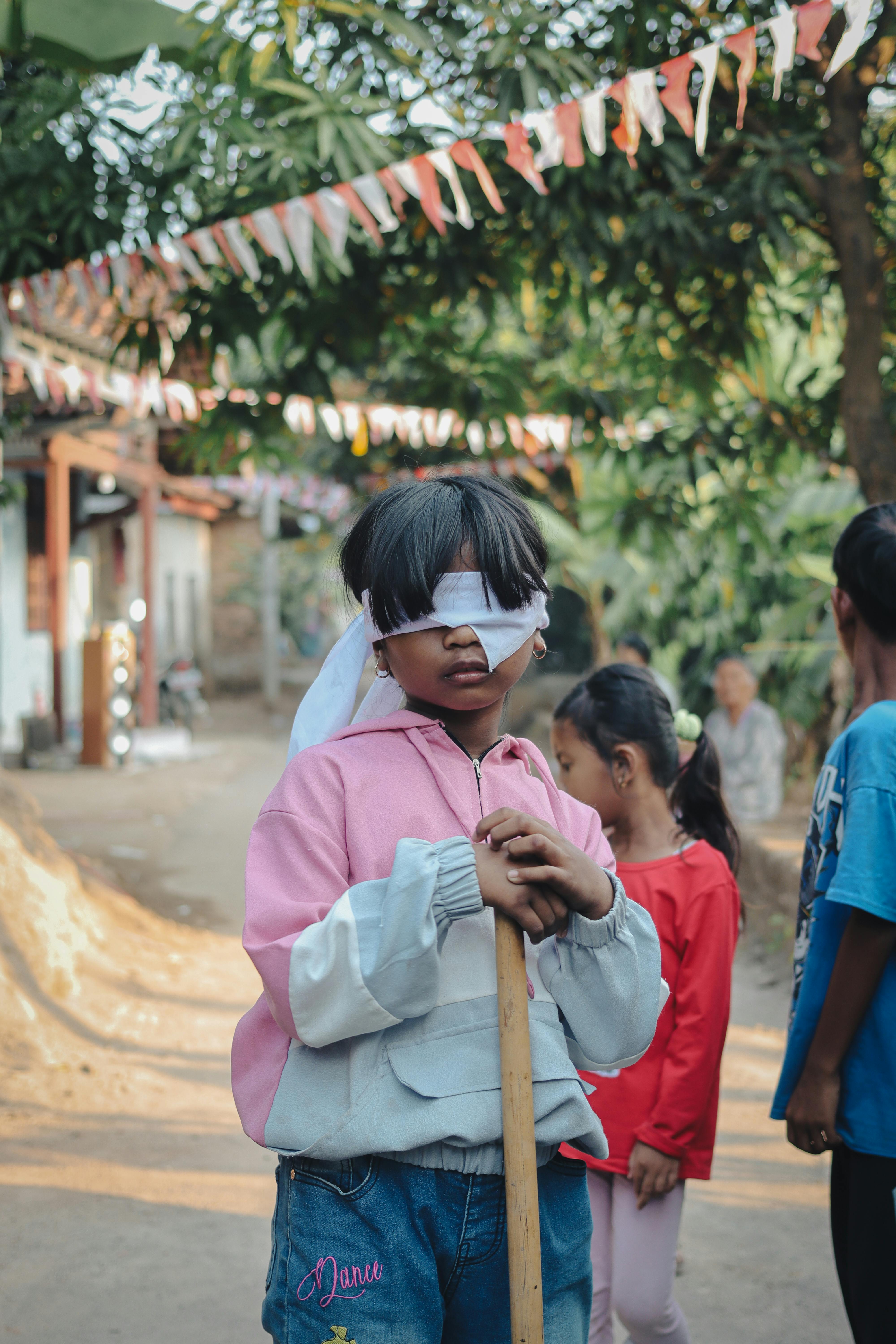 Children Playing Traditional Game Outdoors in Indonesia · Free Stock Photo