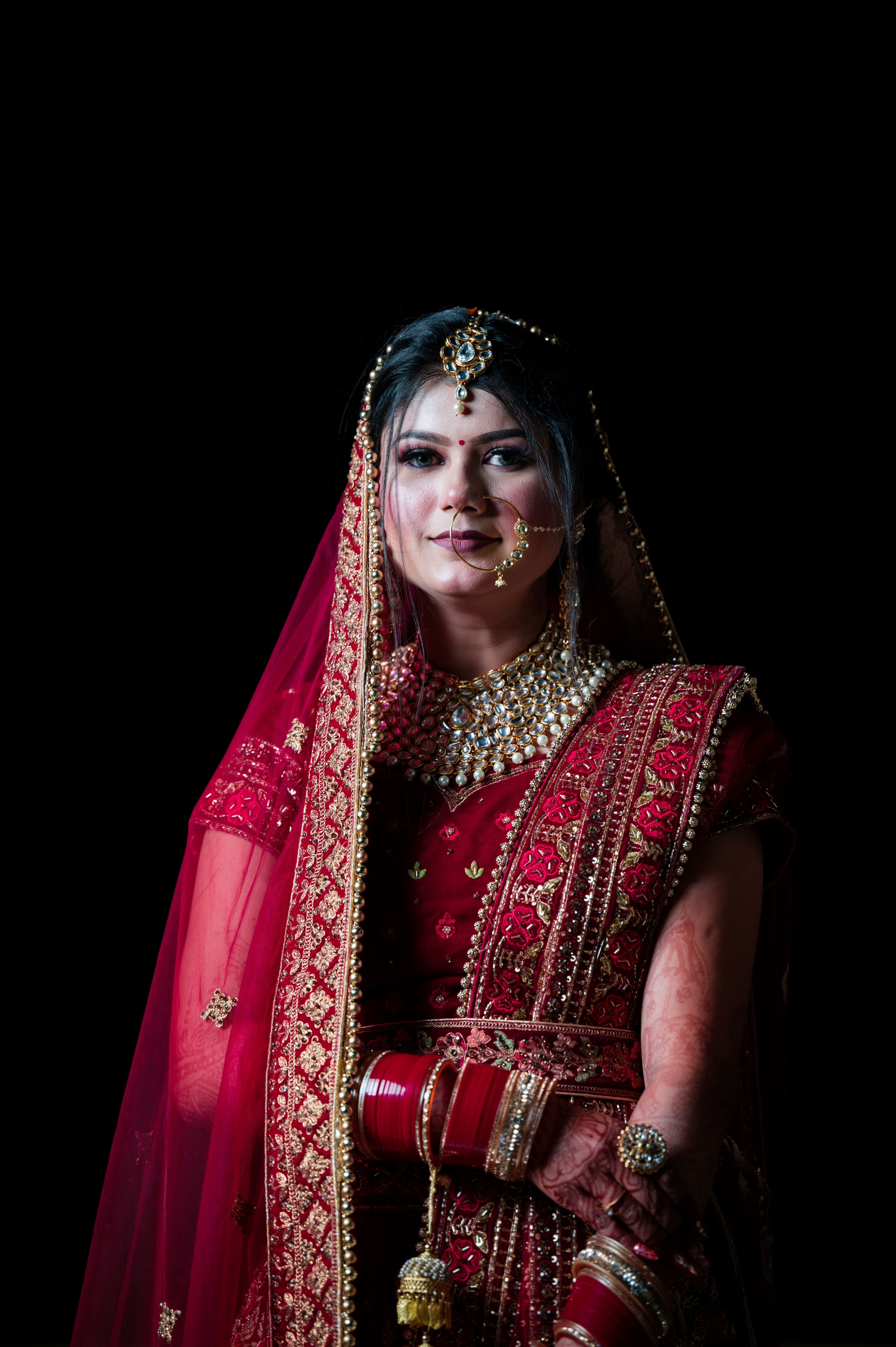 Elegant Bride in Traditional Red Wedding Attire · Free Stock Photo