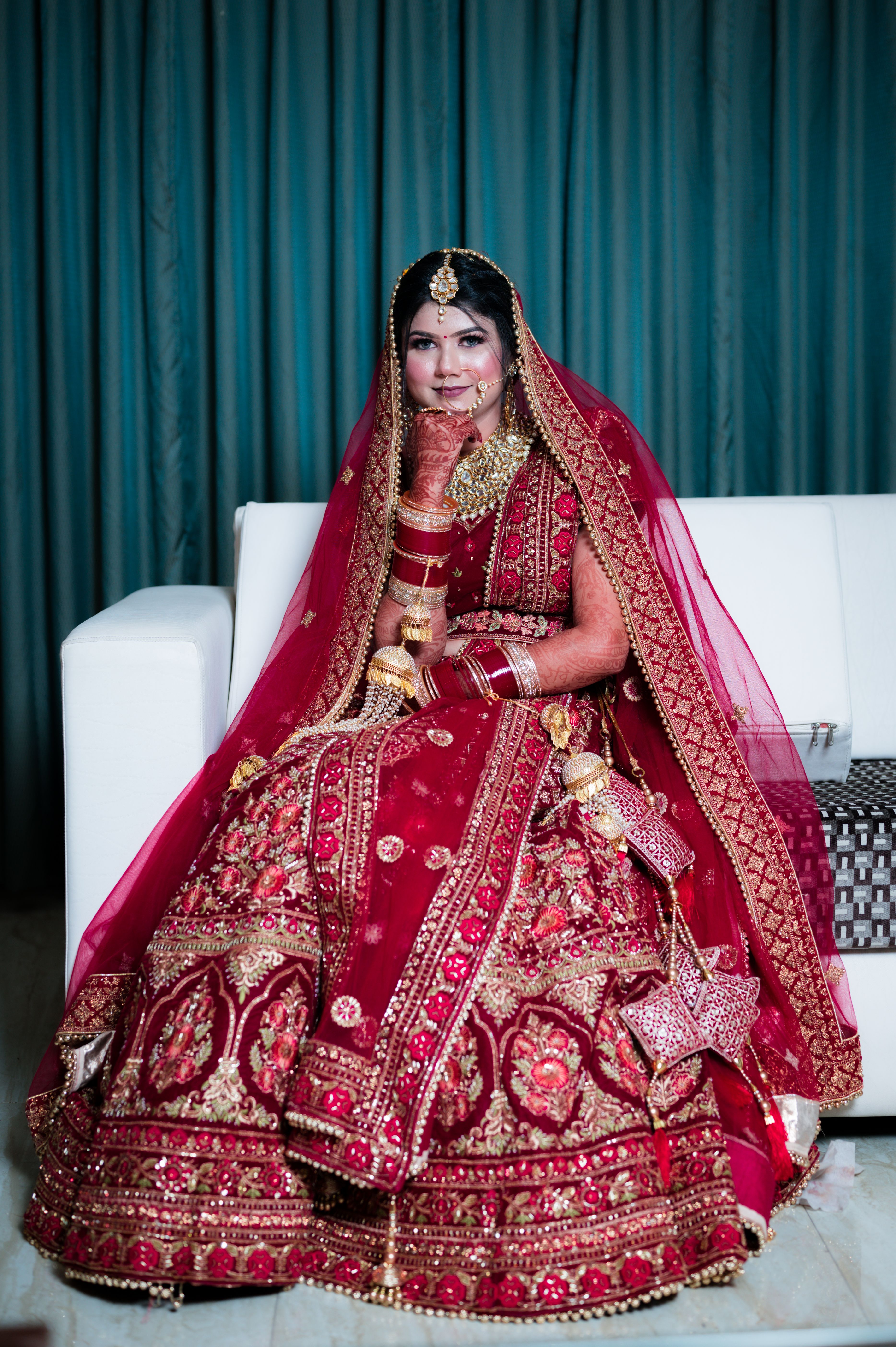 Elegant Bride in Traditional Red Wedding Attire · Free Stock Photo