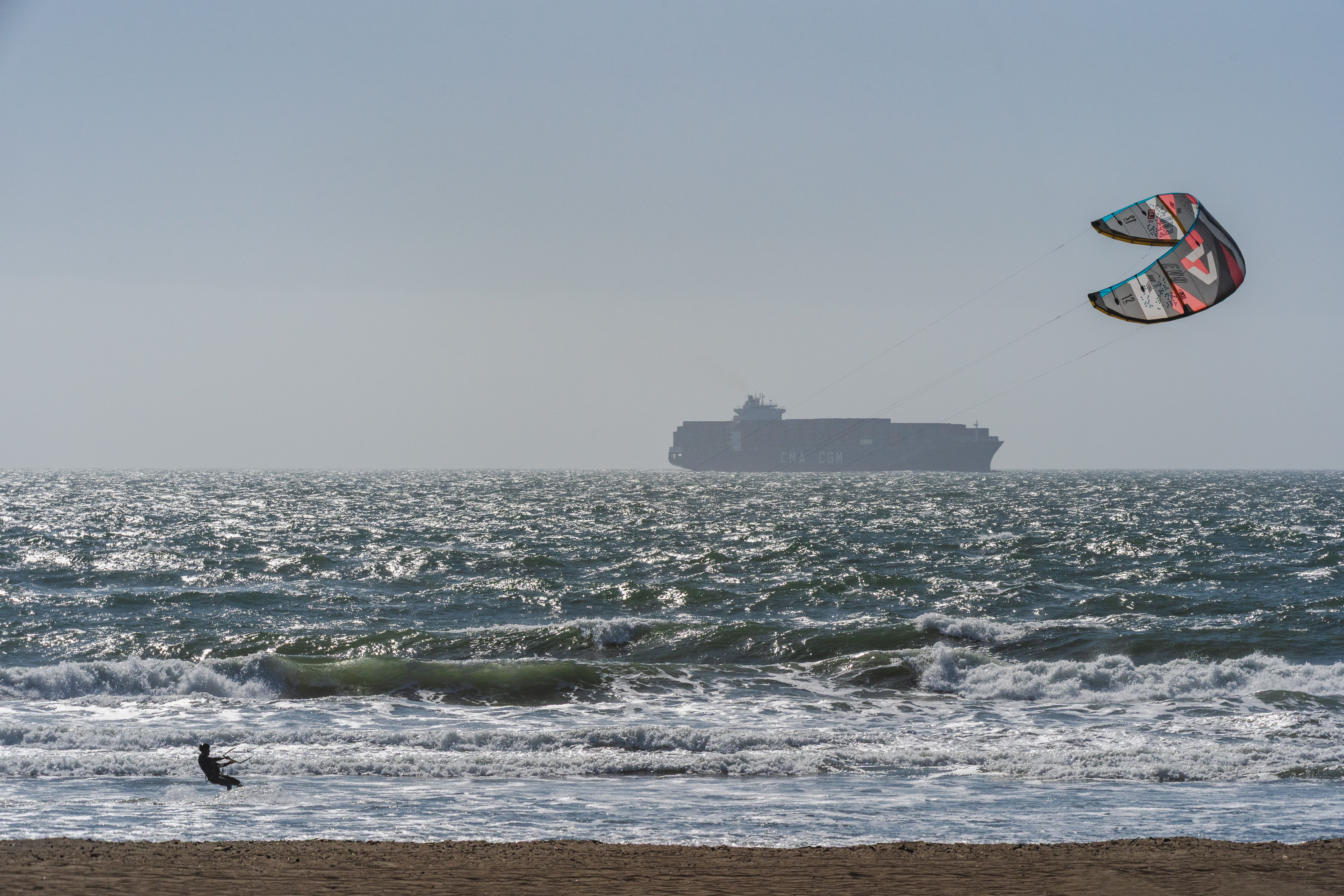 Kitesurfing Adventure on Open Sea Horizon · Free Stock Photo