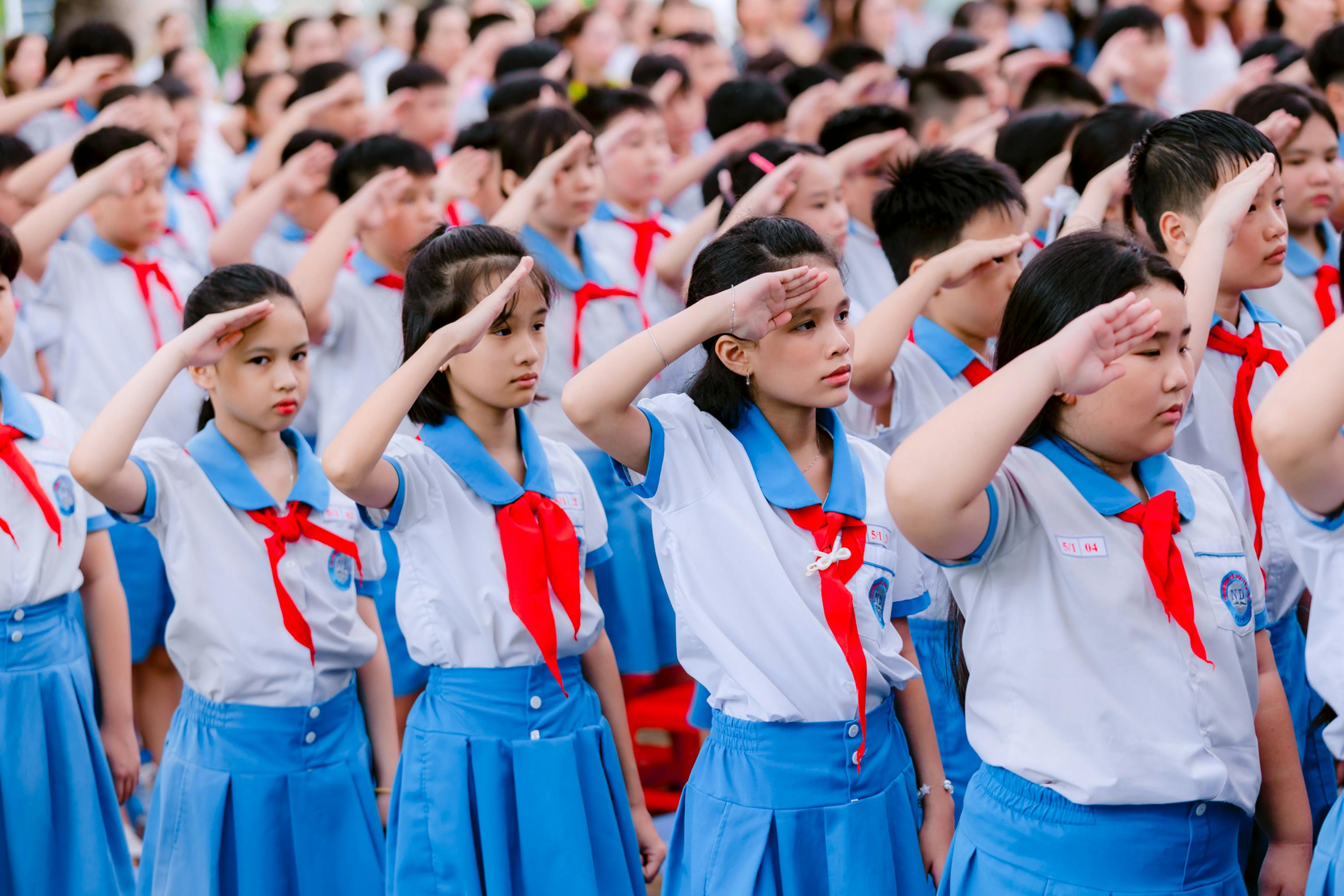 Students Saluting in Uniform Outdoors · Free Stock Photo